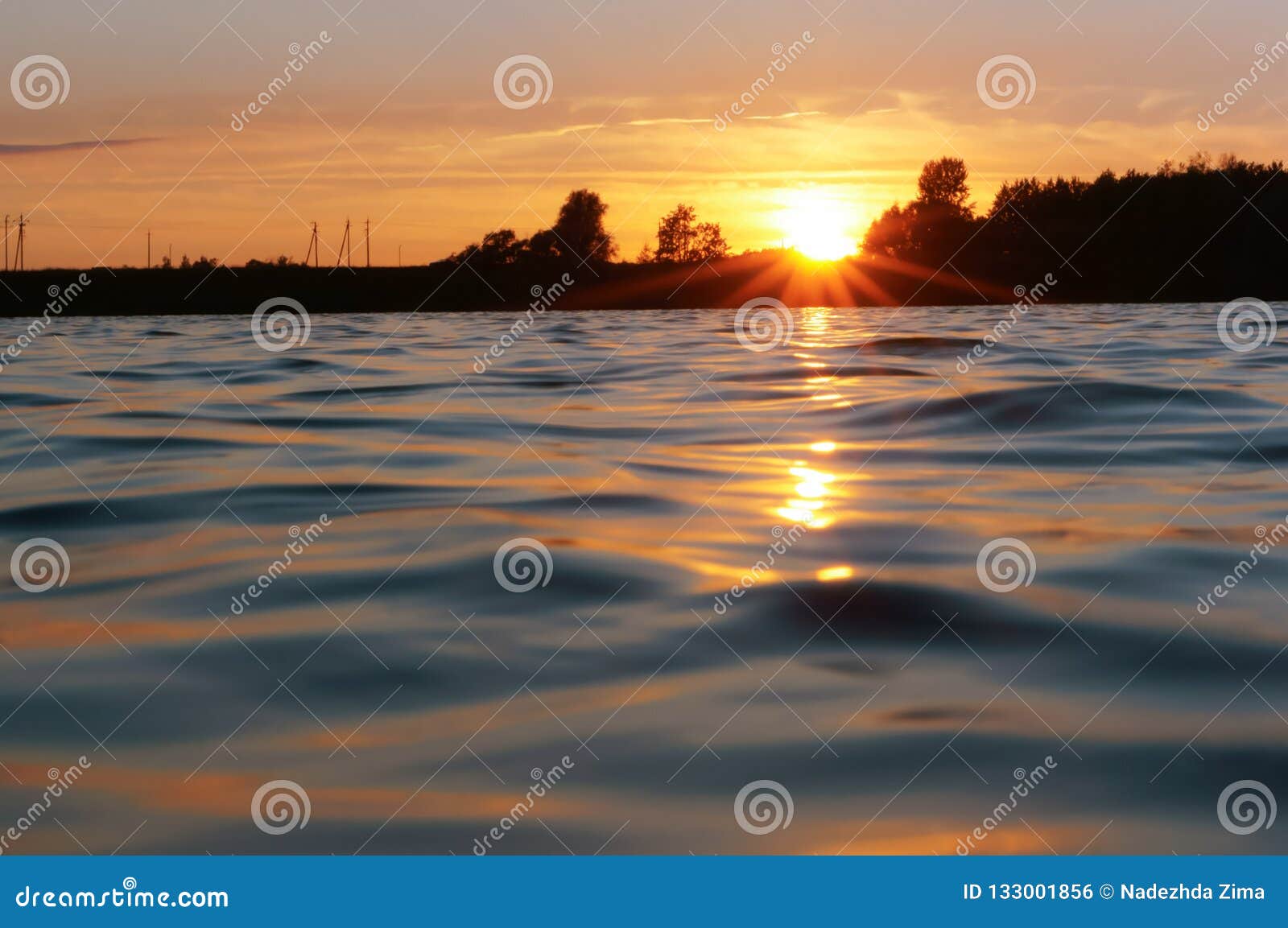 A Beautiful Sunset Over the Lake, Sunset on the Lake Stock Photo ...
