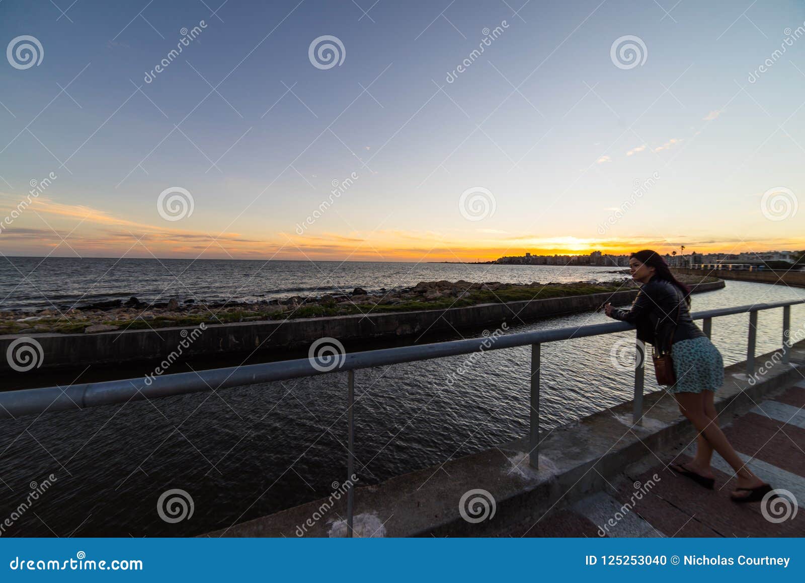 Beautiful Sunset Over the Boardwalk and Beach of Montevideo, Uruguay ...