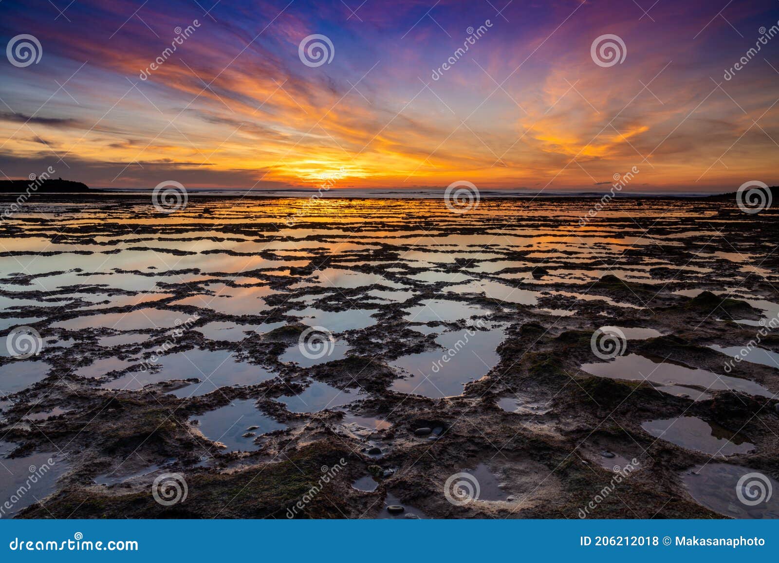 Beautiful Sunset Over the Ocean with Rocky Beach and Tidal Pools in the ...
