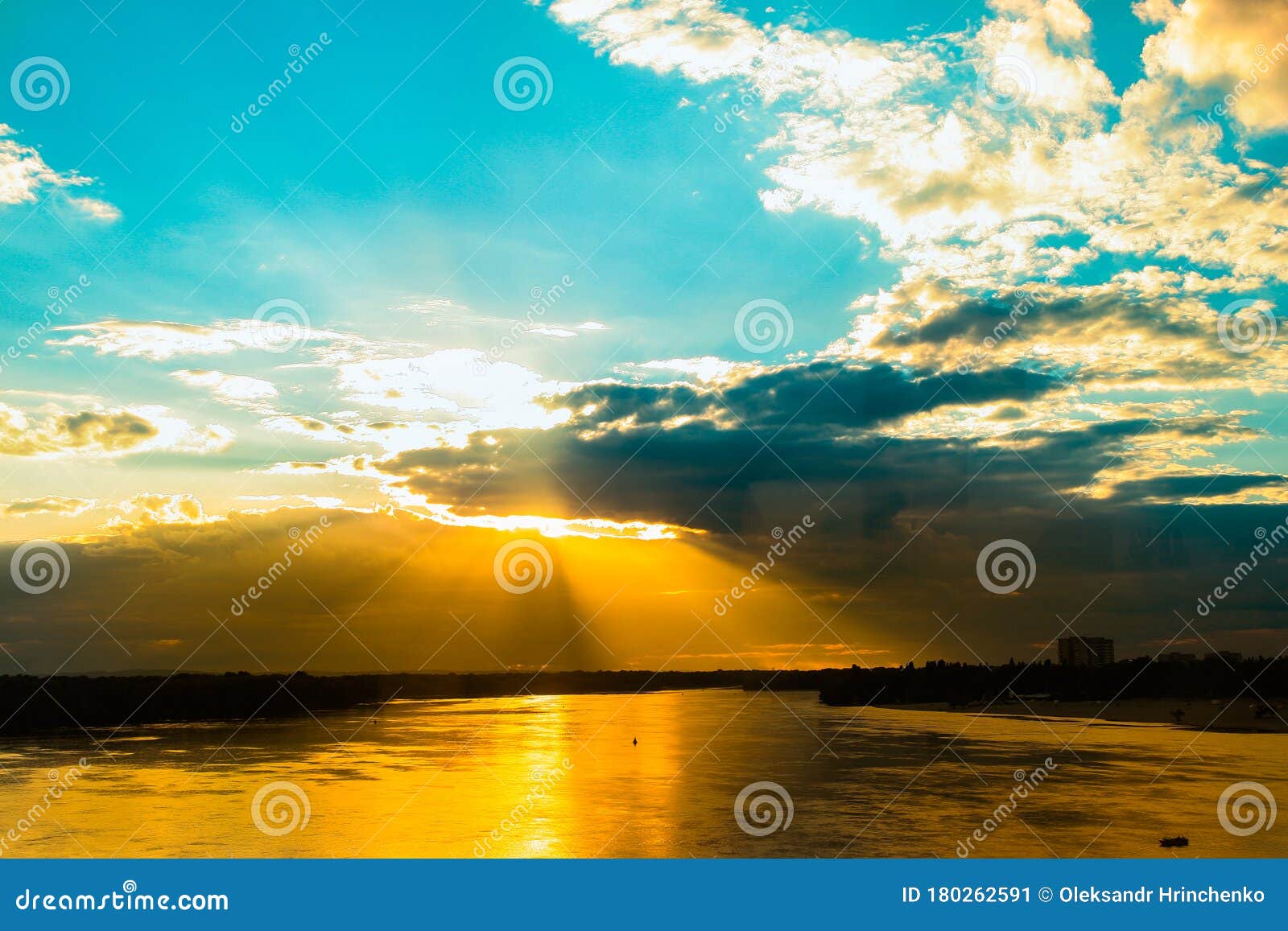 Beautiful Sunset Over the River and the Rays of the Sun Shine through ...