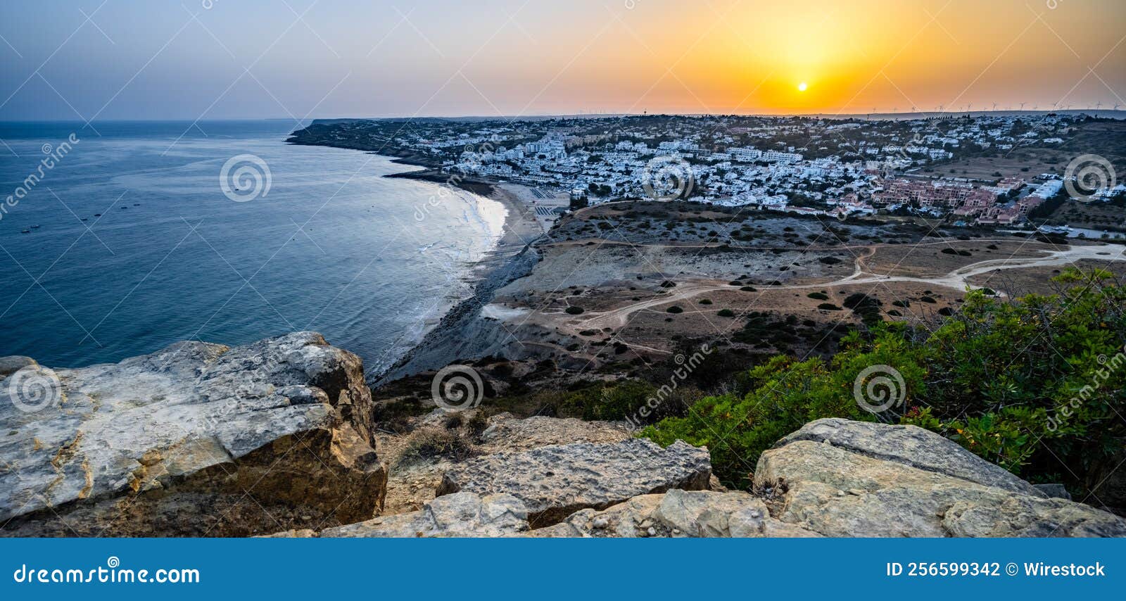 Beautiful Sunset Over the Town and the Beach. Stock Photo - Image of ...