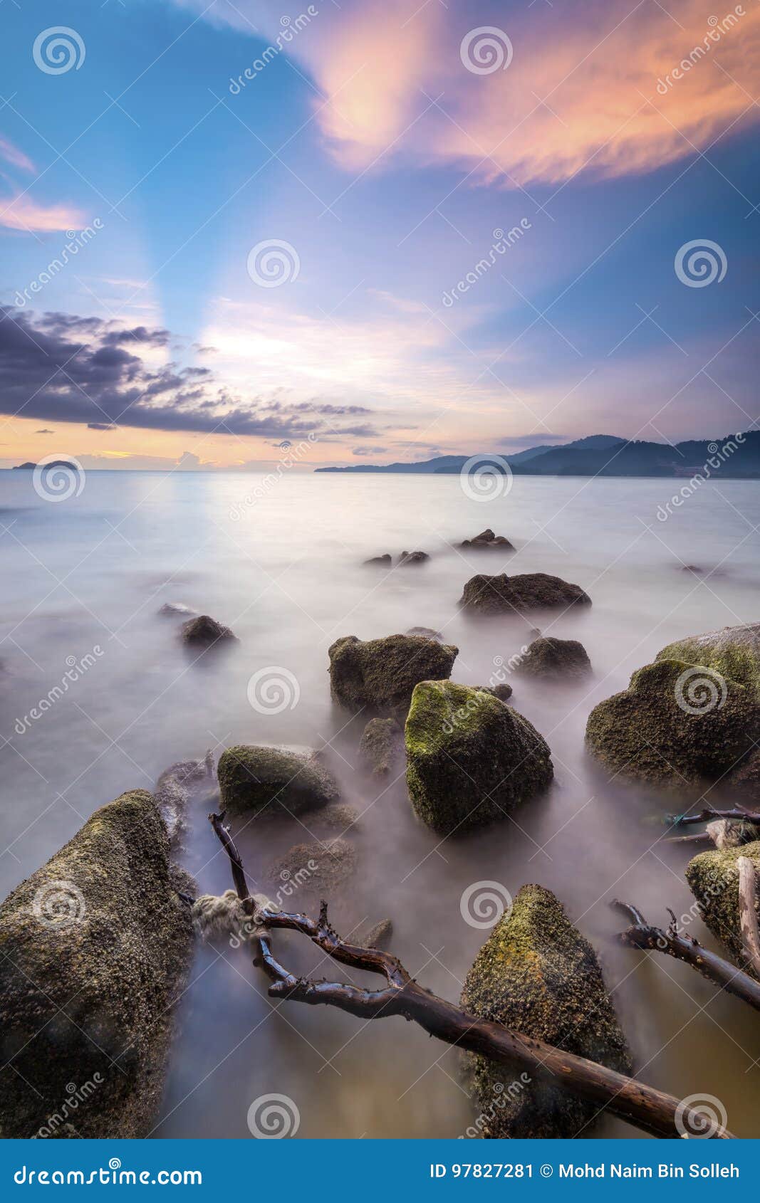 Beautiful Sunset with Ray of Light at Beach. Stock Image - Image of ...