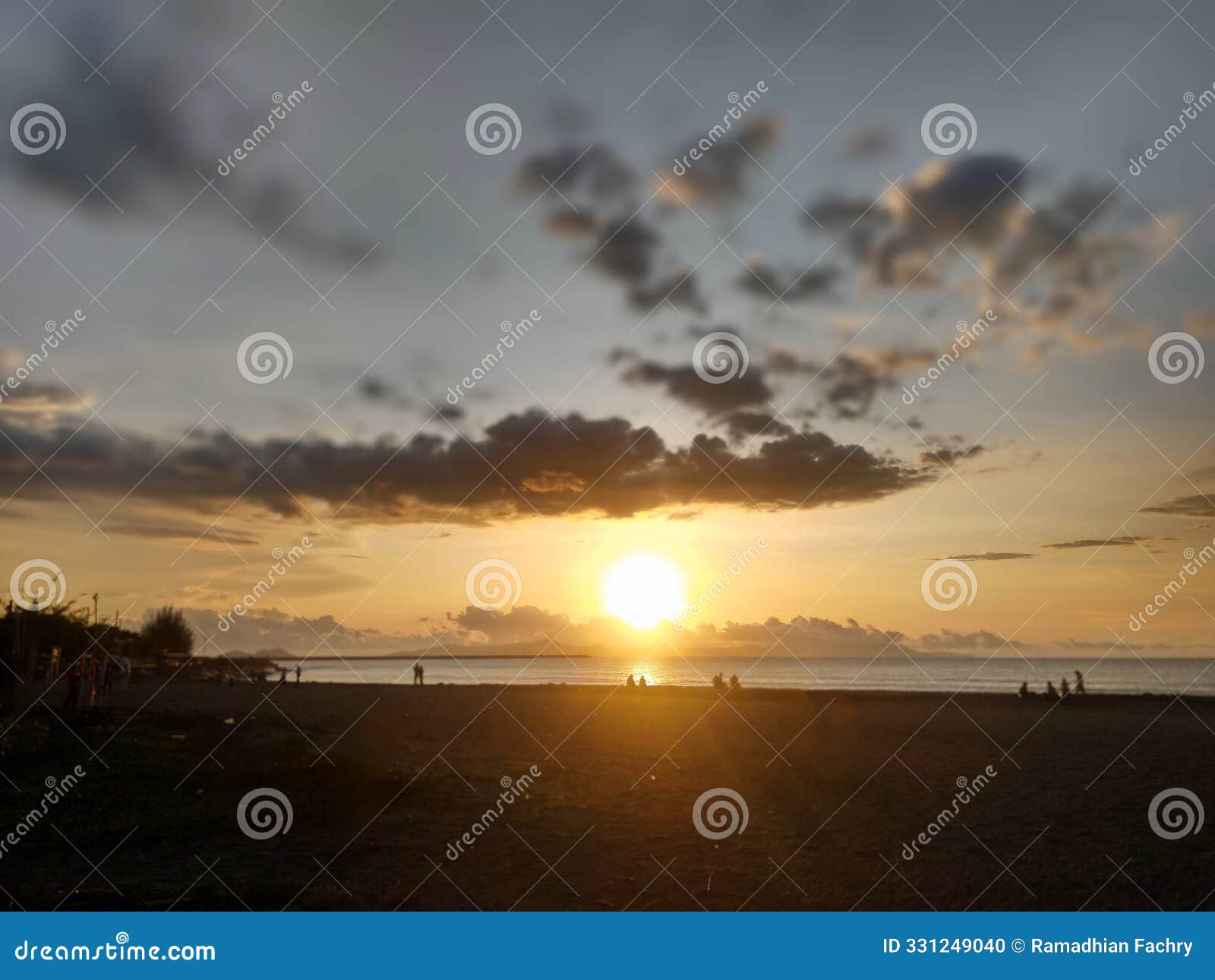 Beautiful Sunset Rays Radiate Around the Beach Stock Photo - Image of ...