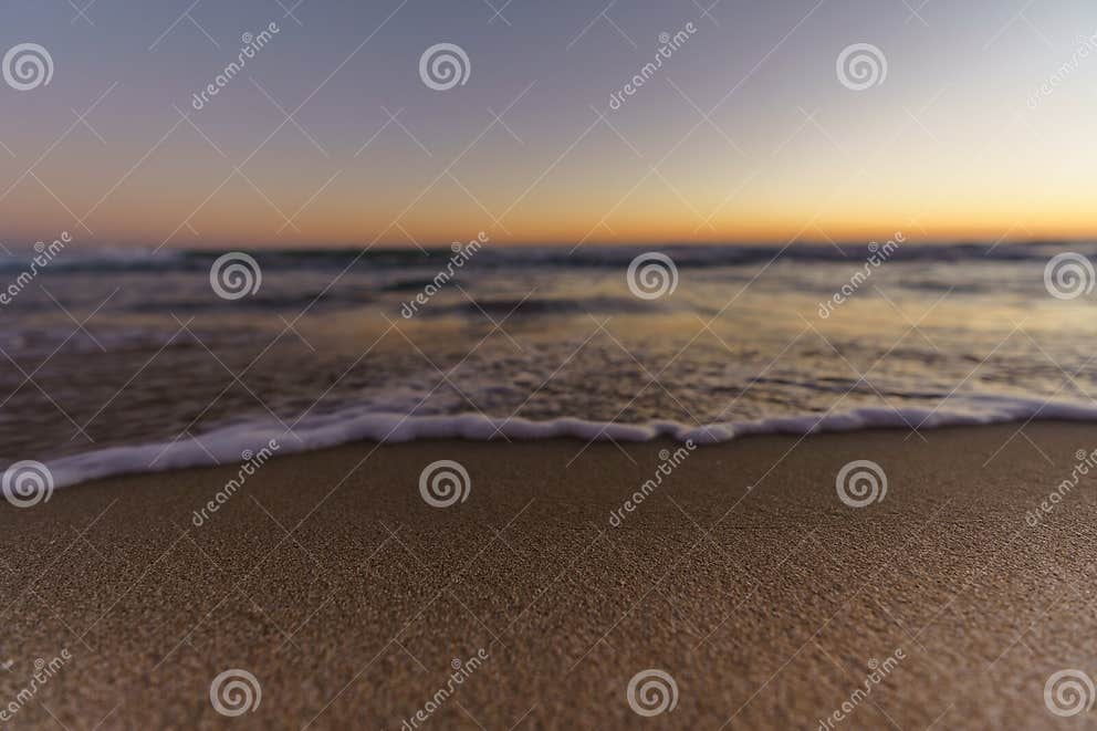 Beautiful Sunset on a Sandy and Calm and Smooth Beach Stock Photo ...