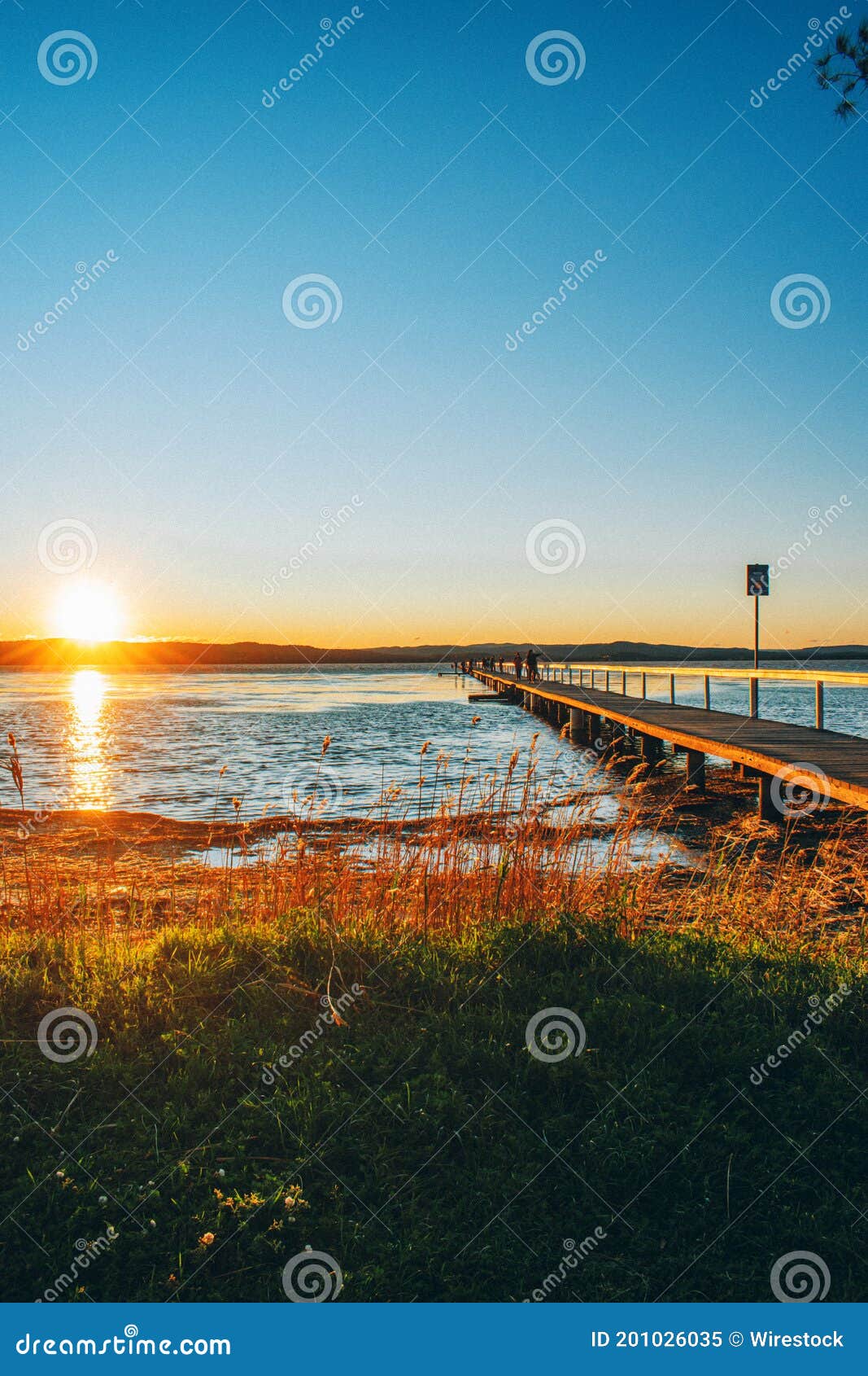 Beautiful Sunset Scenery Over a Pier in a Lake Stock Image - Image of ...