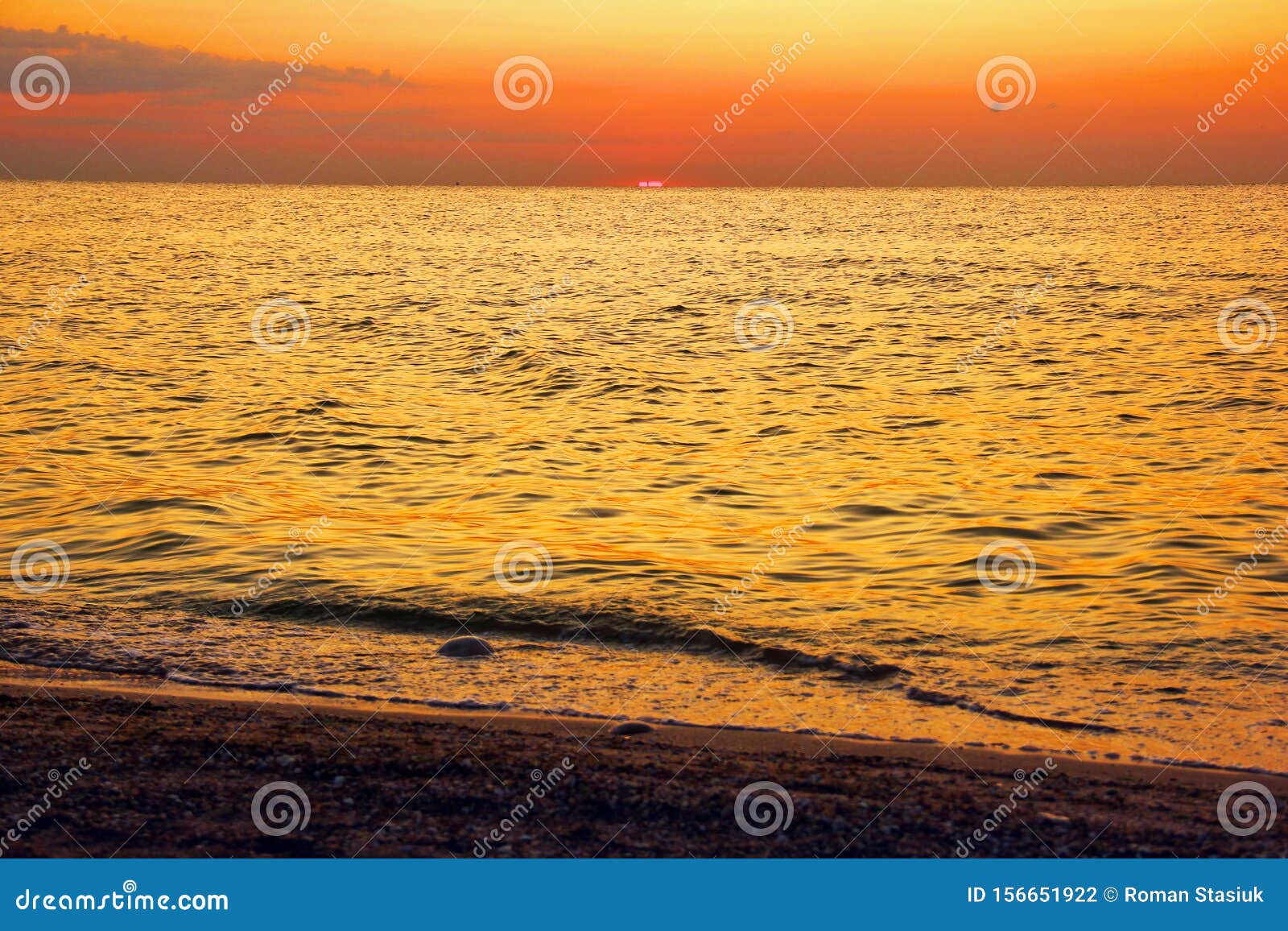 Beautiful Sunset at the Sea. the Sea in the Foreground Stock Photo ...