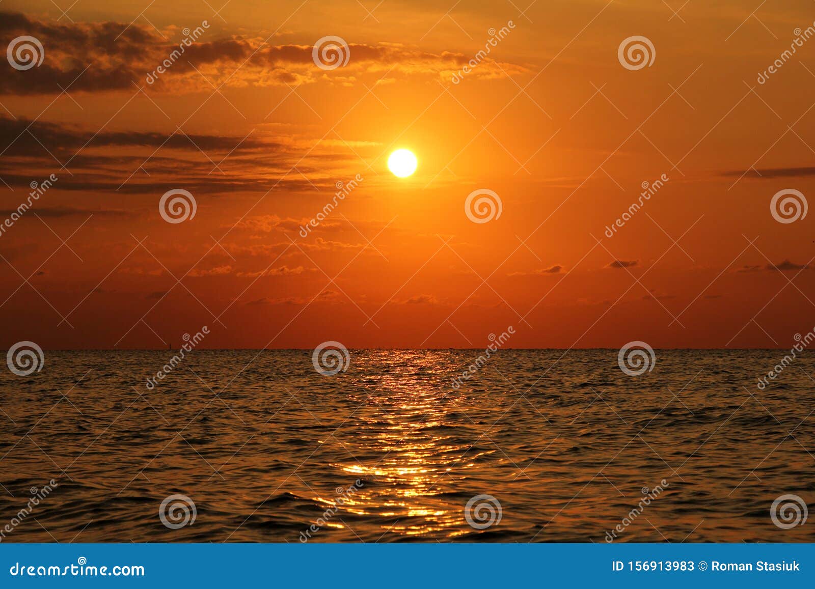 Beautiful Sunset at the Sea. the Sea in the Foreground Stock Image ...