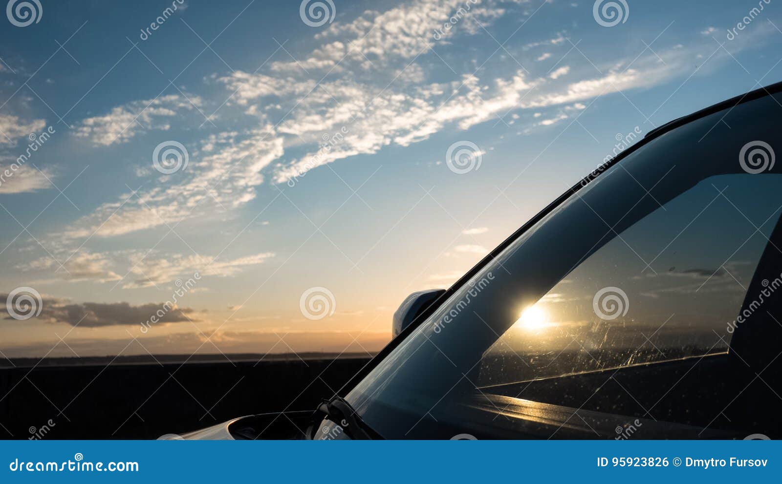 Beautiful Sunset and Sky with Clouds through the Windshield of the Car ...