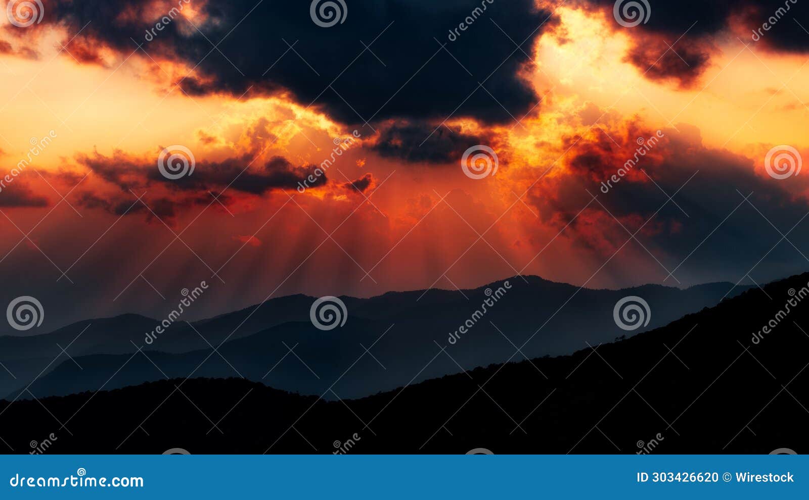 Beautiful Sunset Sky with Dramatic Sun Rays Over a Mountain Landscape ...