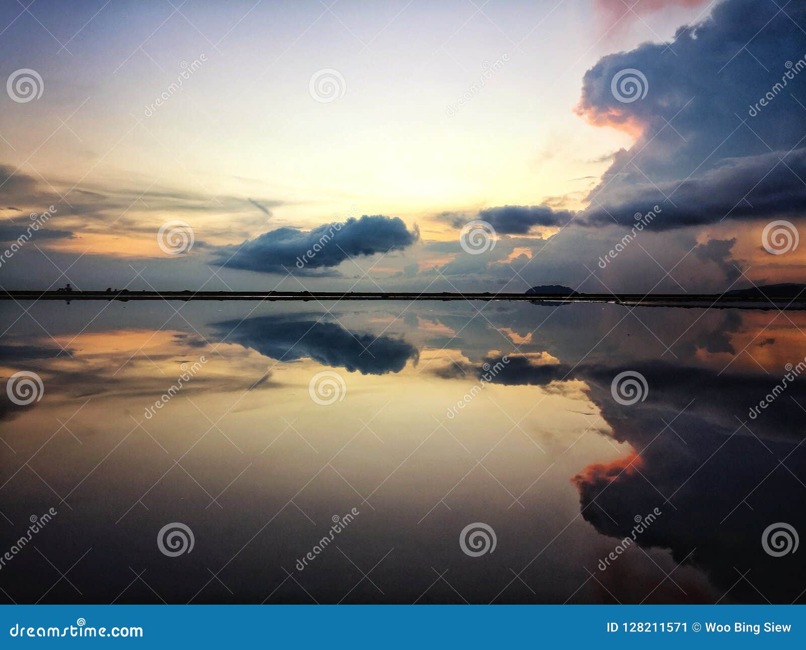 Beautiful Sunset with Sky Mirror Stock Image - Image of water, clouds ...