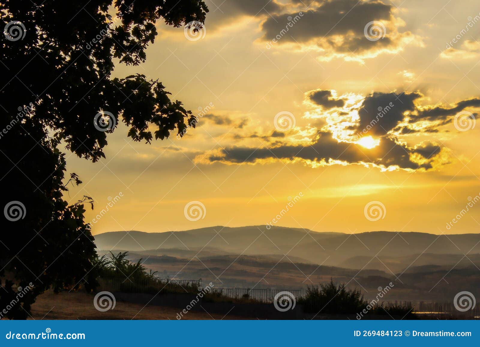 A Sunset with the Sun Rays Shining Stock Image - Image of yellow ...