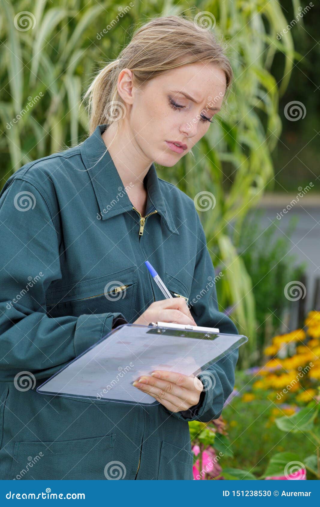 Beautiful Supervisor Writing on Clipboard Stock Photo - Image of female ...