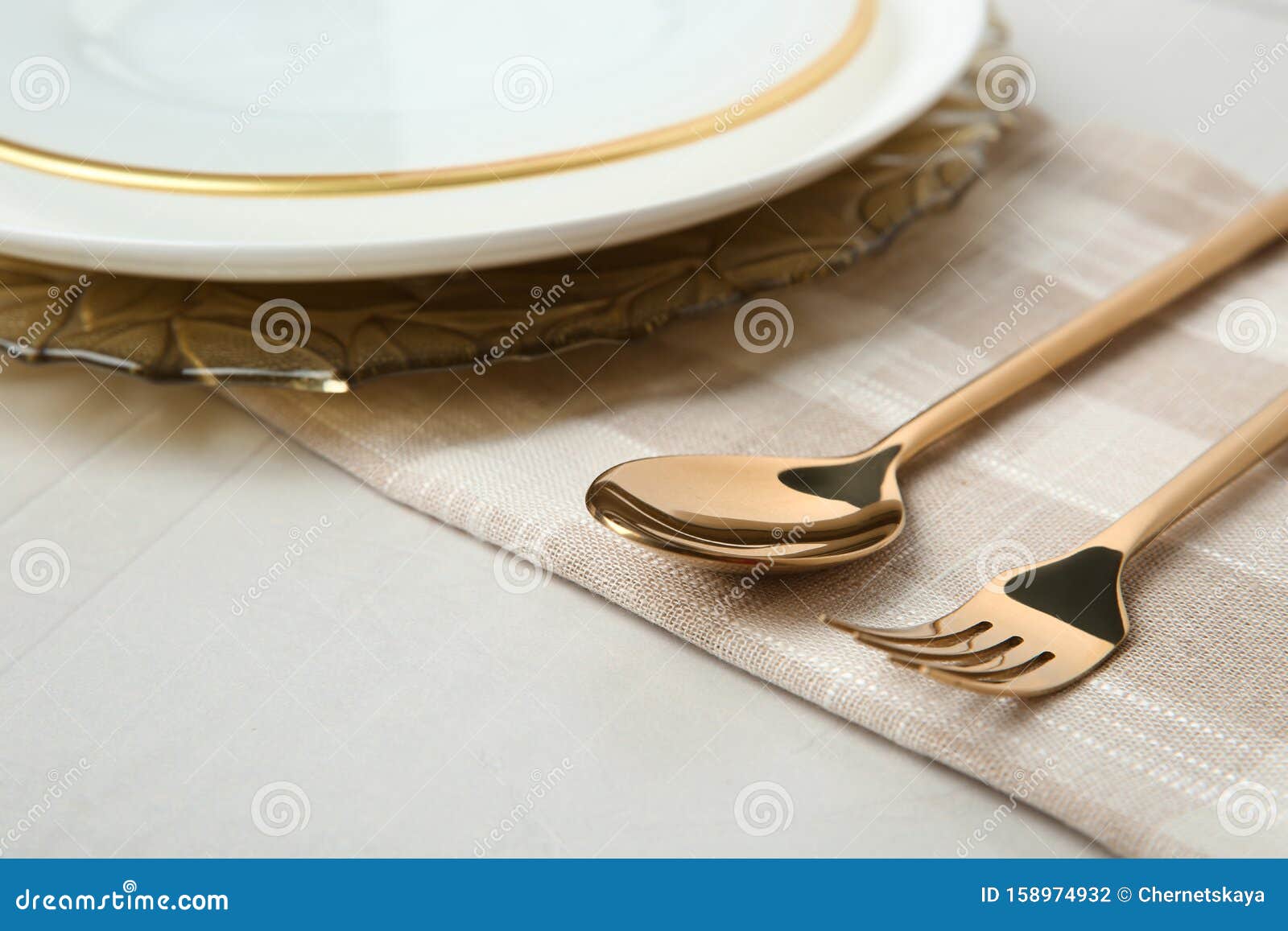 Beautiful Table Setting with Gold Cutlery on Background Stock Photo ...