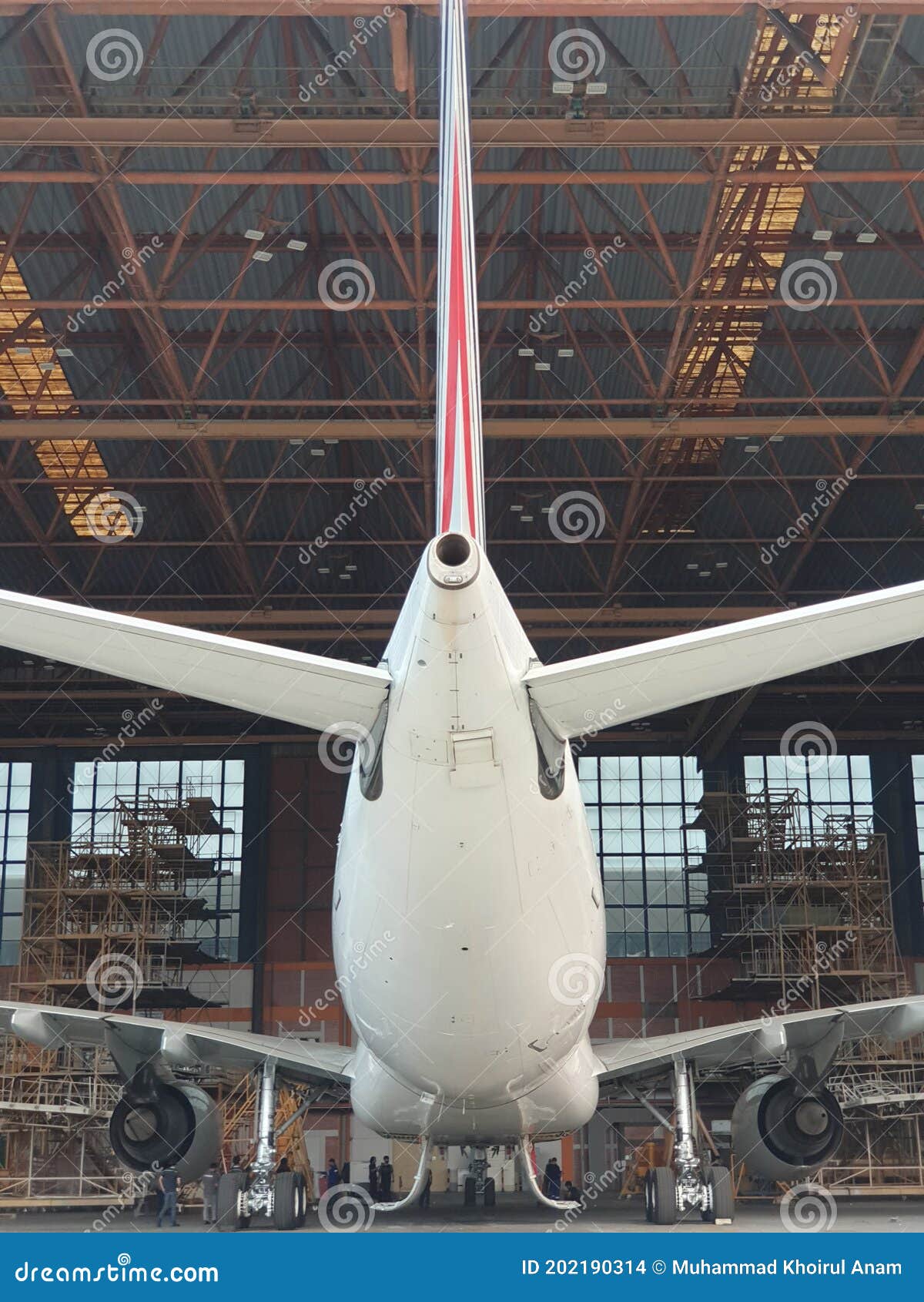 Tail Of Aircraft. White Tail Of Aircraft On Blue Sky Background ...