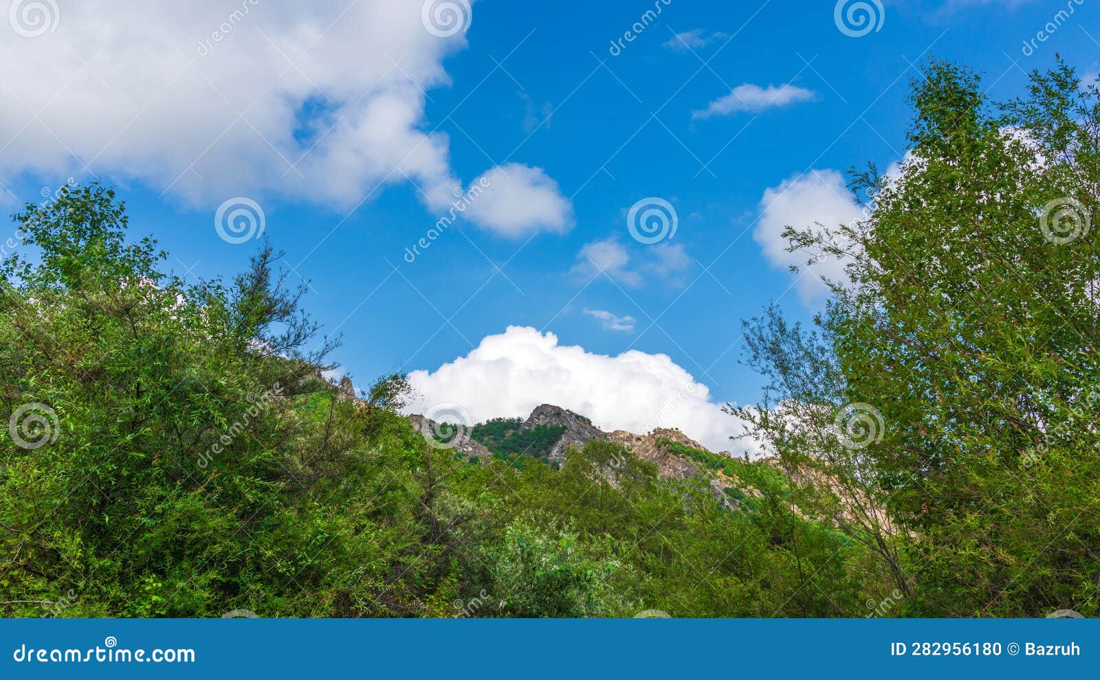 Beautiful Thick Clouds Over Big Crag in the Blue Sky Stock Photo ...