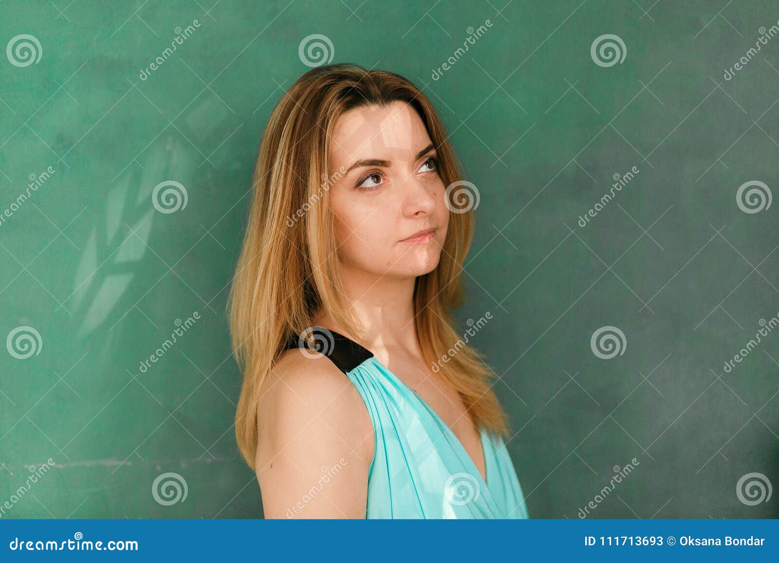 Beautiful Thoughtful Woman Looking Up And Thinking. Isolated On Green ... Beautiful Thoughtful Woman Looking Up And Thinking. Isolated On Green ...