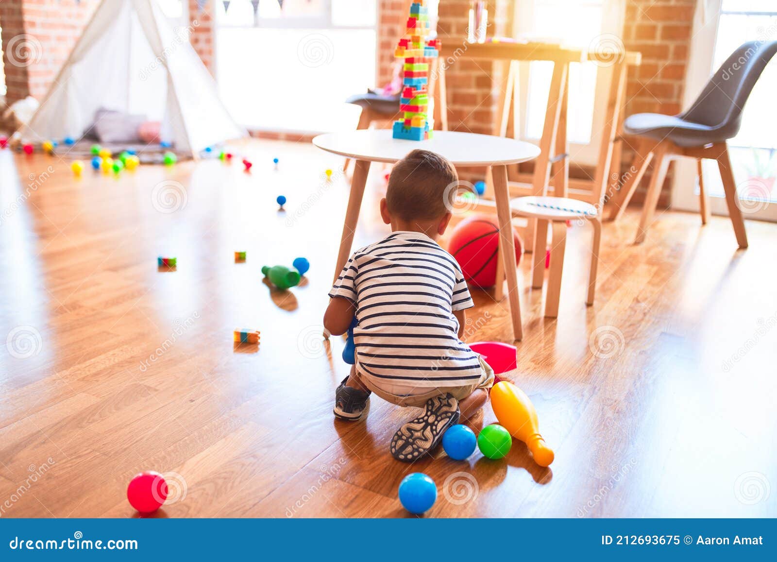 Beautiful Toddler Boy Playing Bowling at Kindergarten Stock Image ...