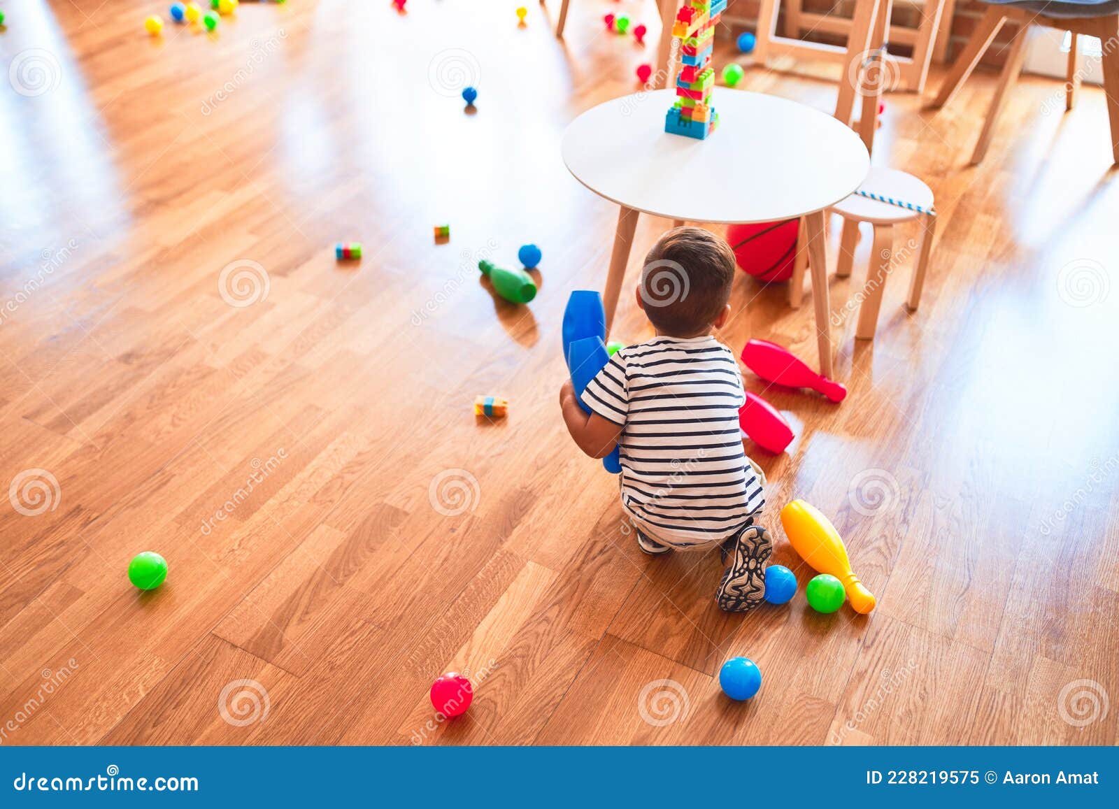 Beautiful Toddler Boy Playing Bowling at Kindergarten Stock Image ...