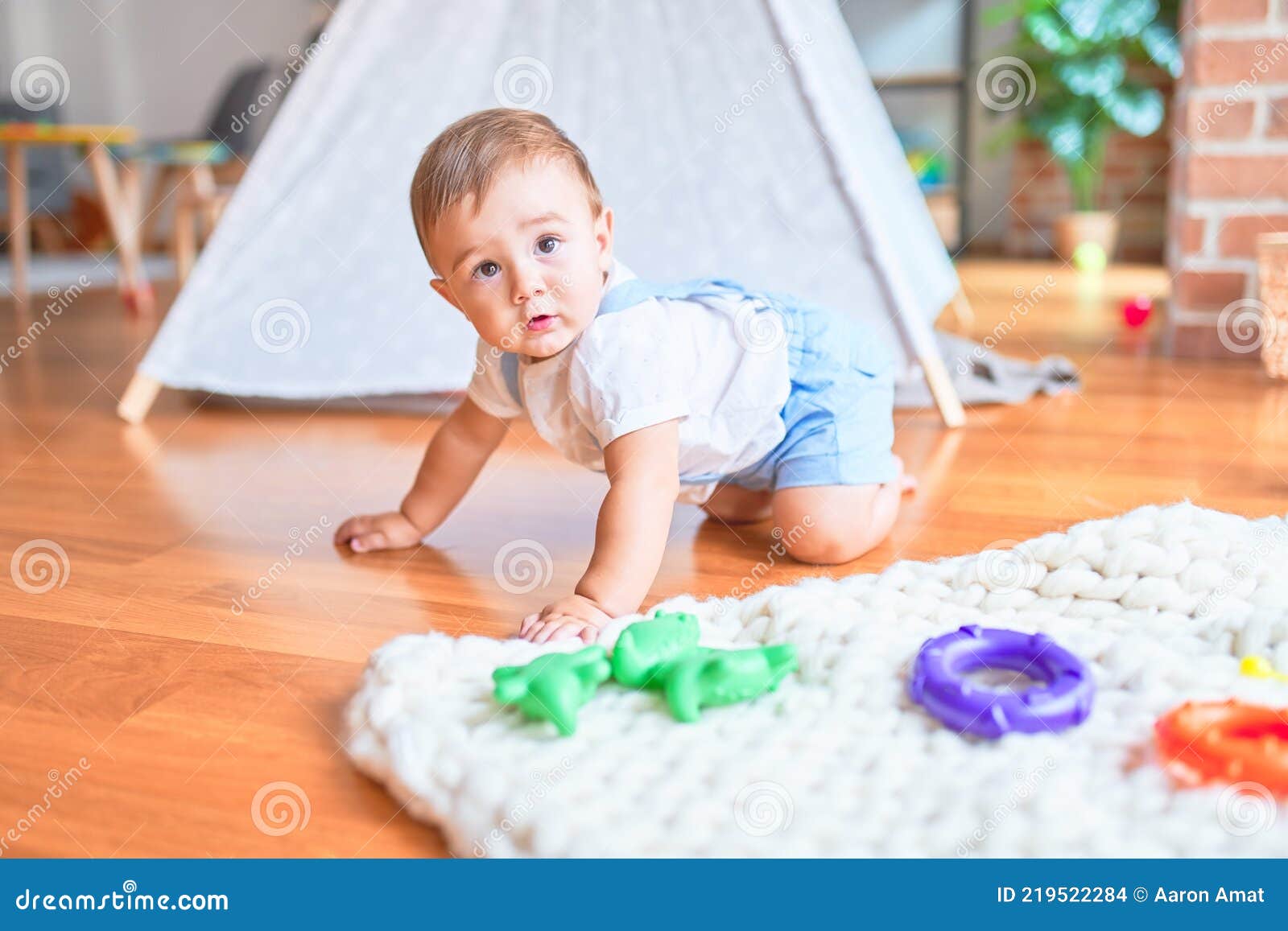Beautiful Toddler Crawling at Kindergarten Stock Photo - Image of ...