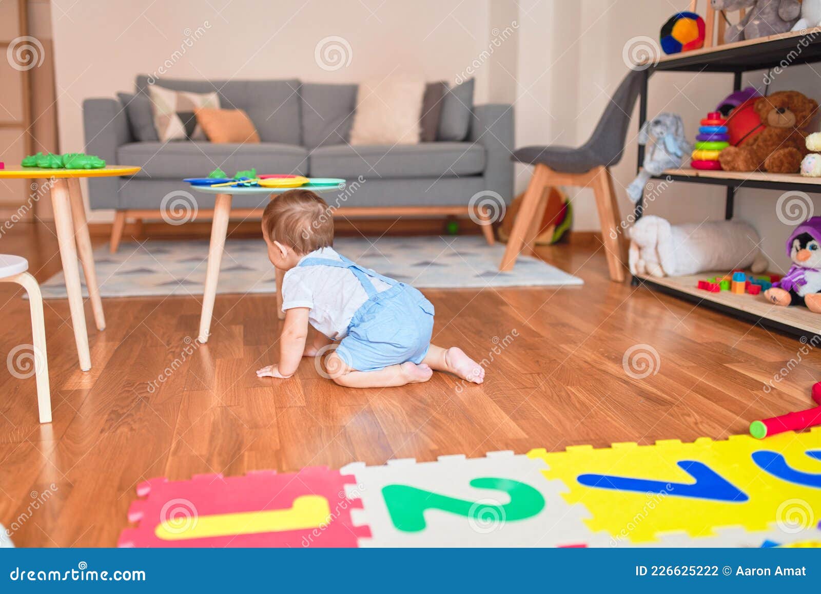 Beautiful Toddler Crawling at Kindergarten Stock Photo - Image of ...