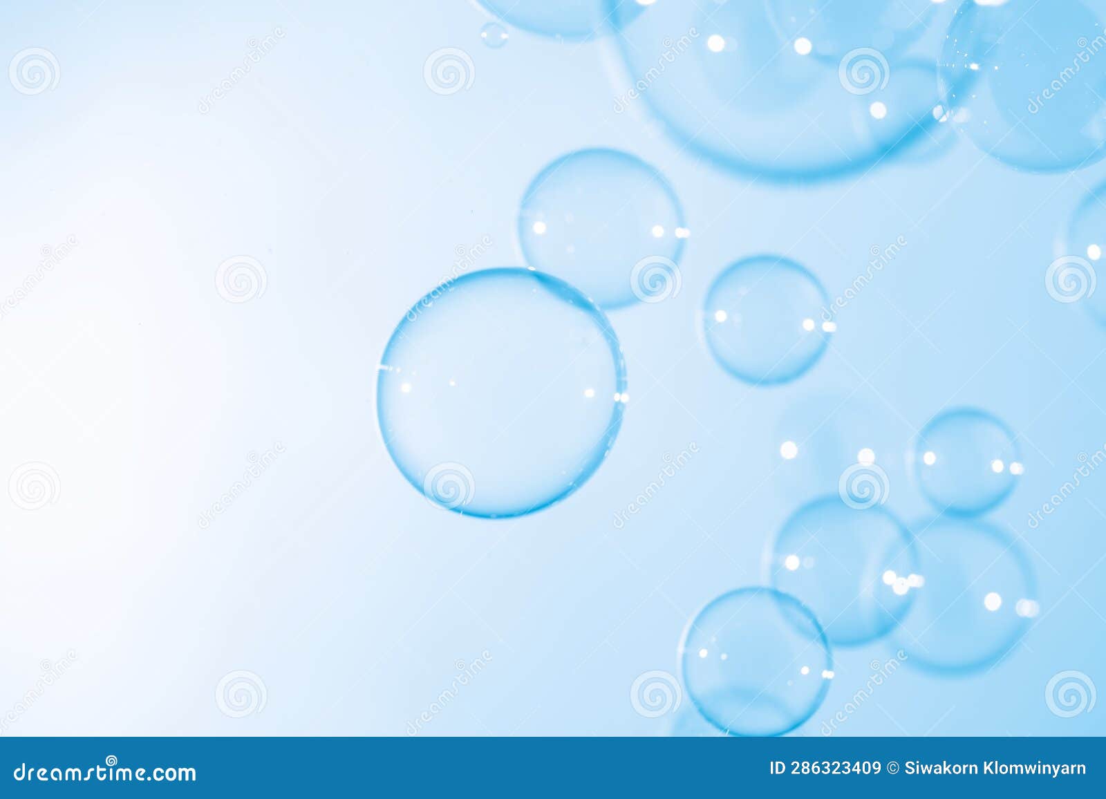 Beautiful Transparent Blue Soap Bubbles Floating in the Air. Refreshing ...