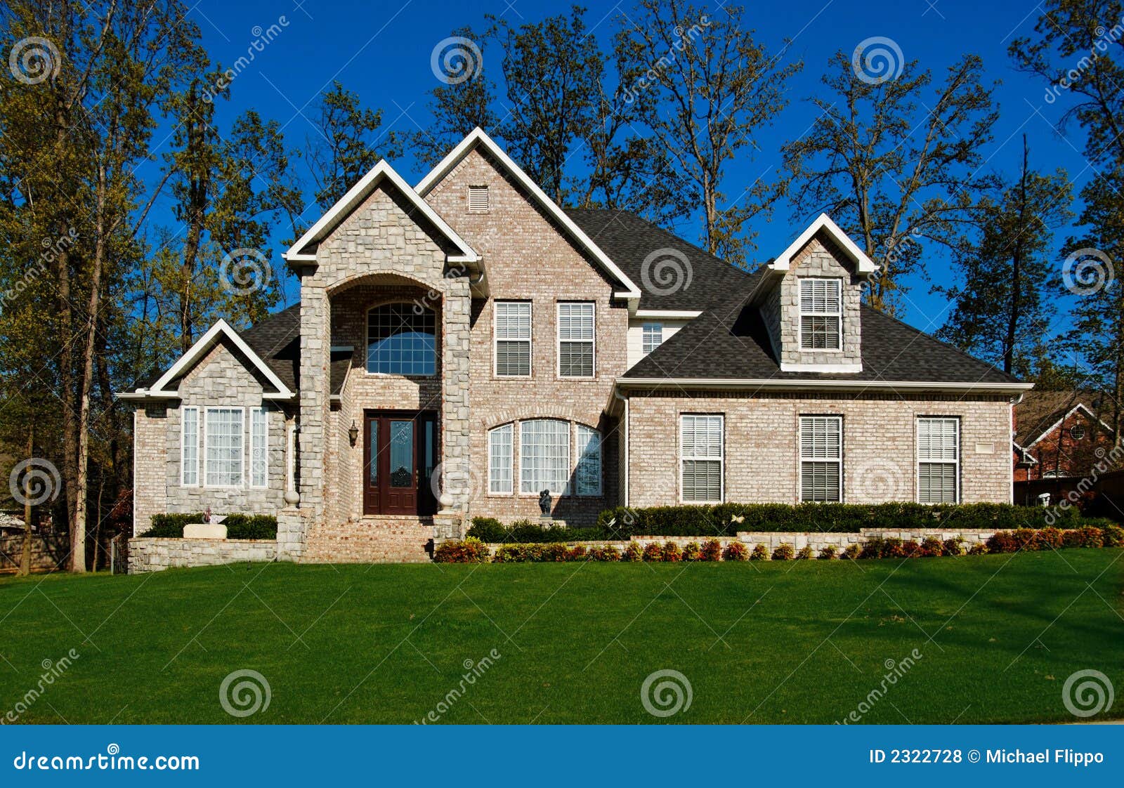Beautiful two-story home stock photo. Image of windows - 2322728