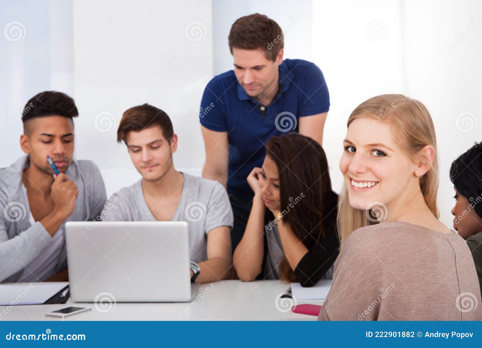 Beautiful University Student Sitting with Classmates Using Laptop Stock ...