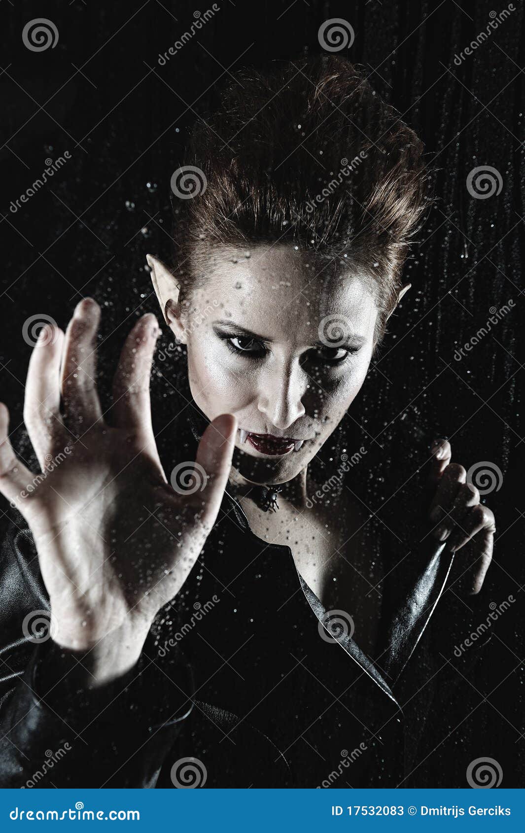 Beautiful Vampire Woman Behind Rainy Window Royalty-Free Stock ...