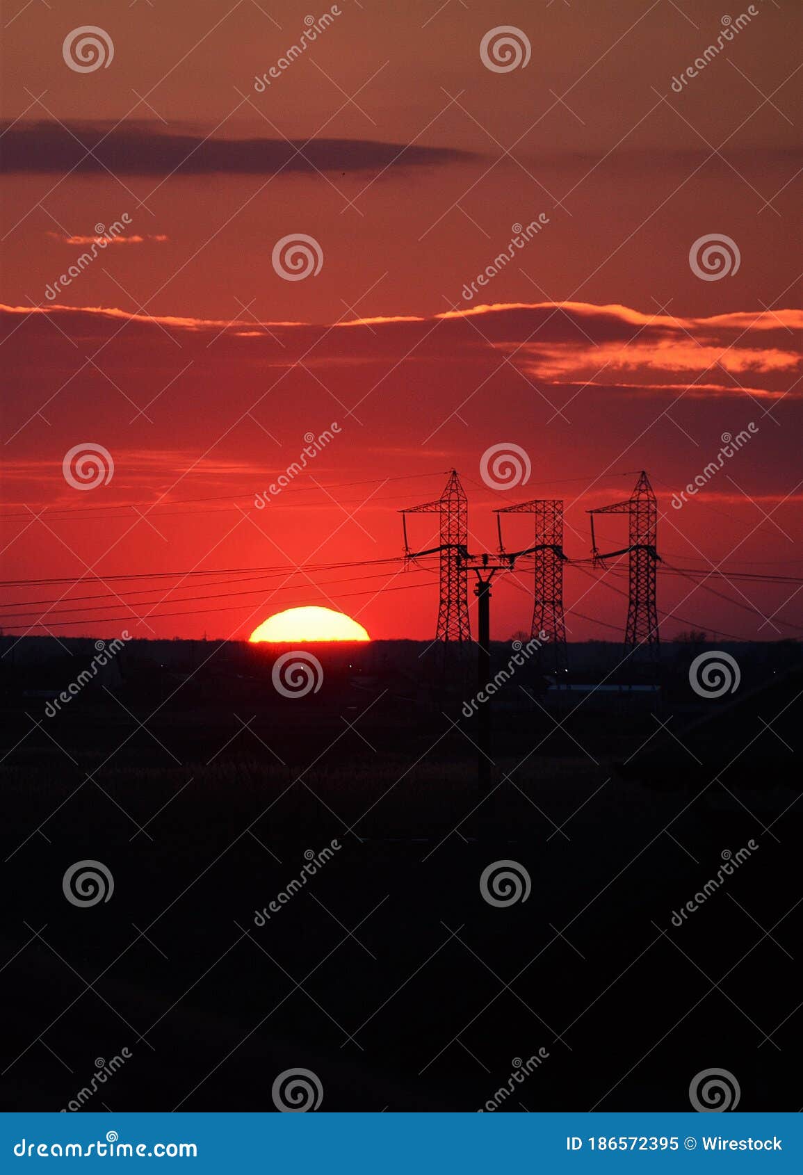 Beautiful Vertical Picture of a Mesmerizing Red Sunset Over the ...
