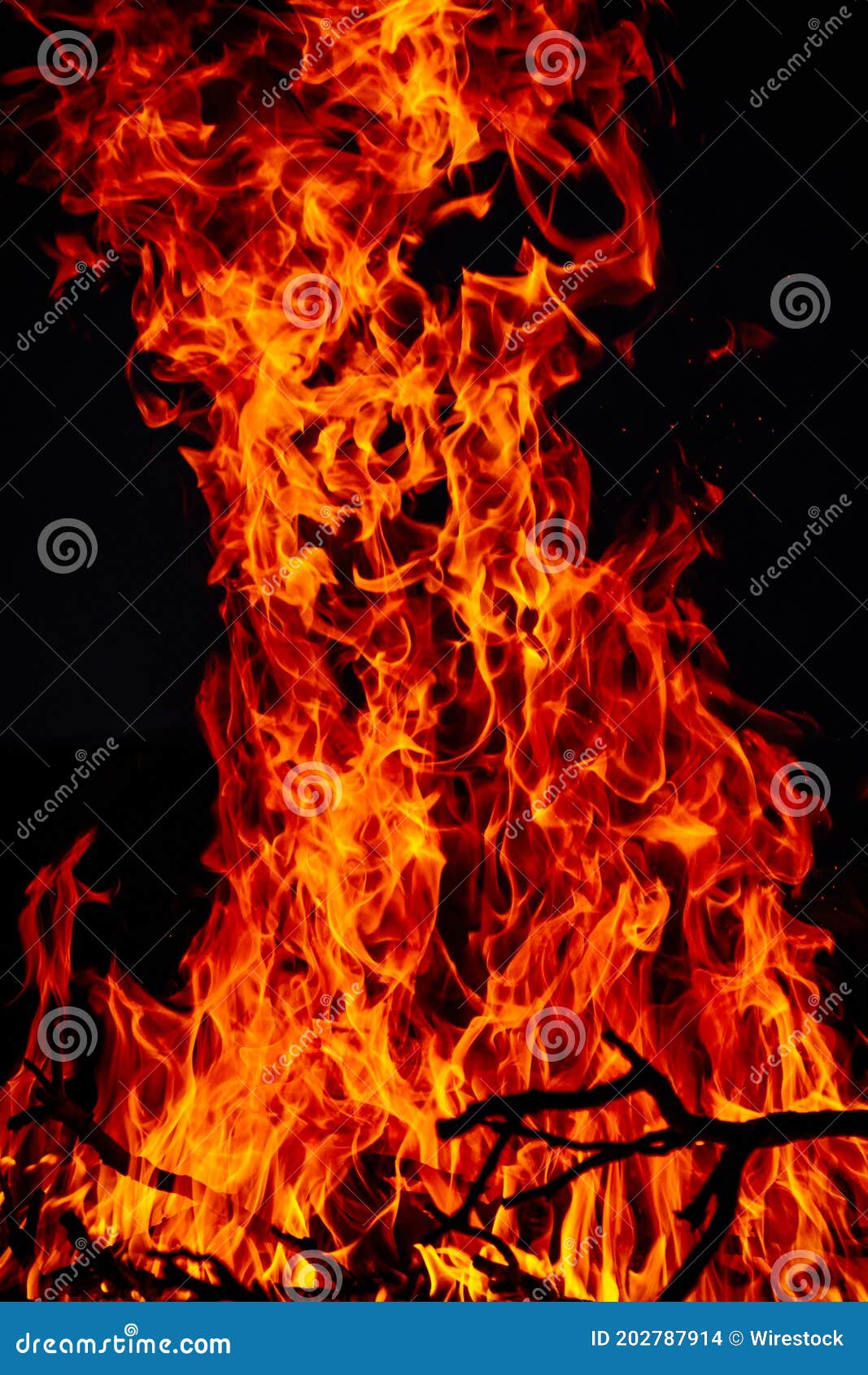 Beautiful Vertical Shot of a Large Burning Fire at Night Stock Photo ...