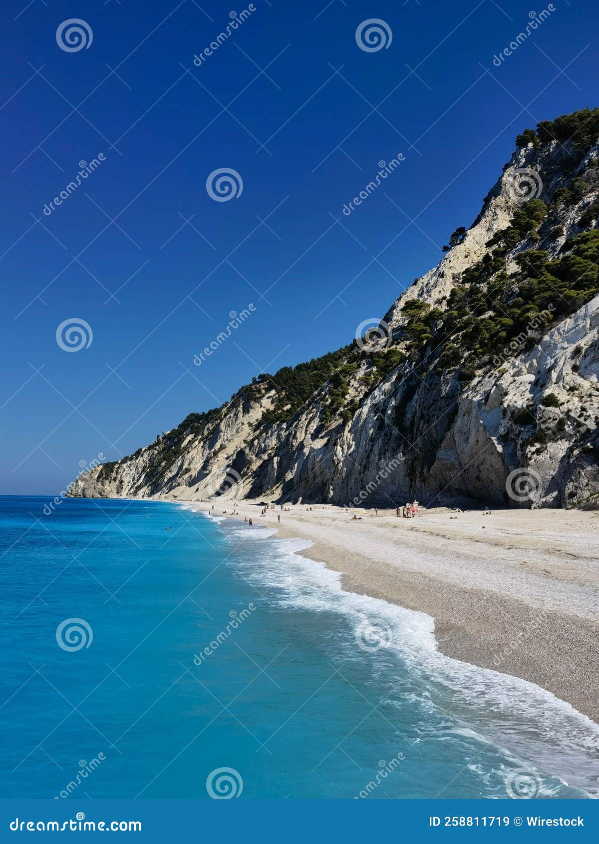 Beautiful Vertical Shot of a Sunny Beach with a Cliff Stock Image ...