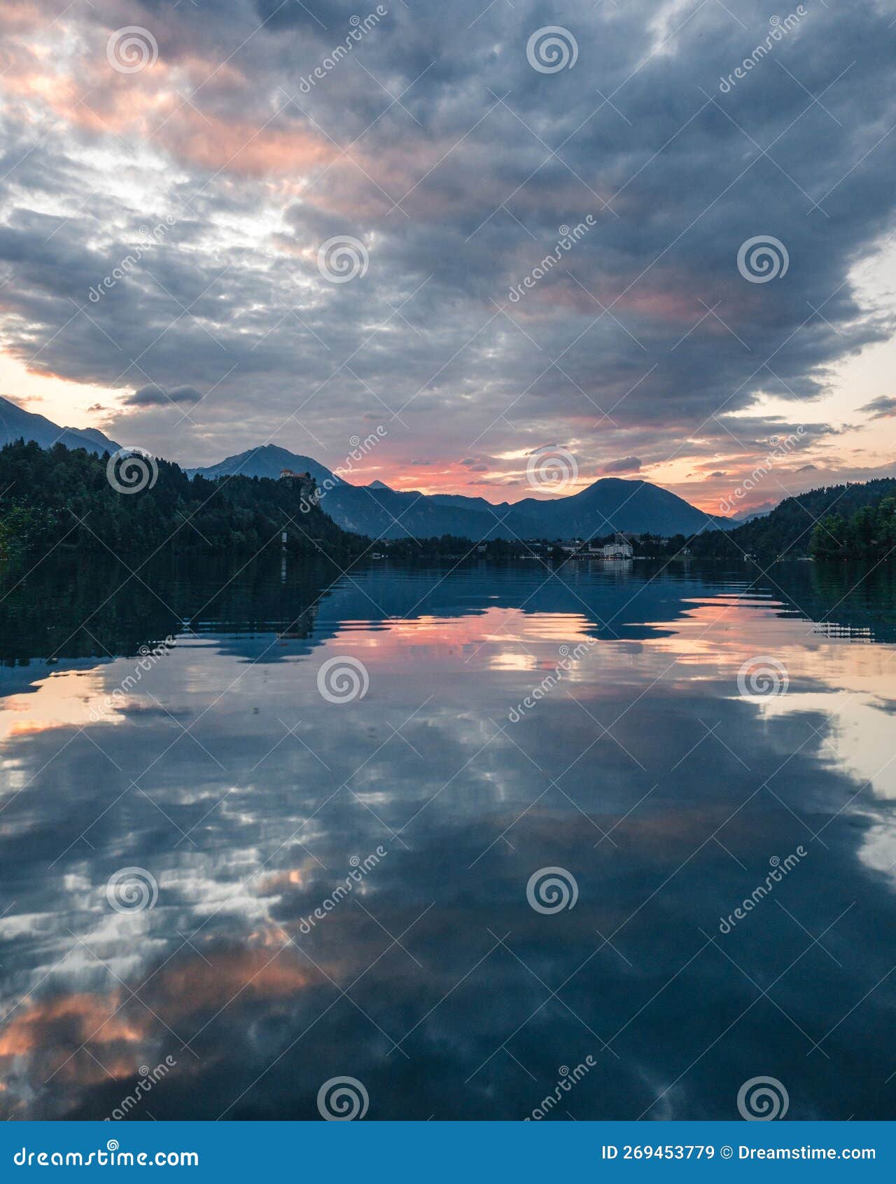 Beautiful Vertical View of a Reflective Lake and Mountain in a ...