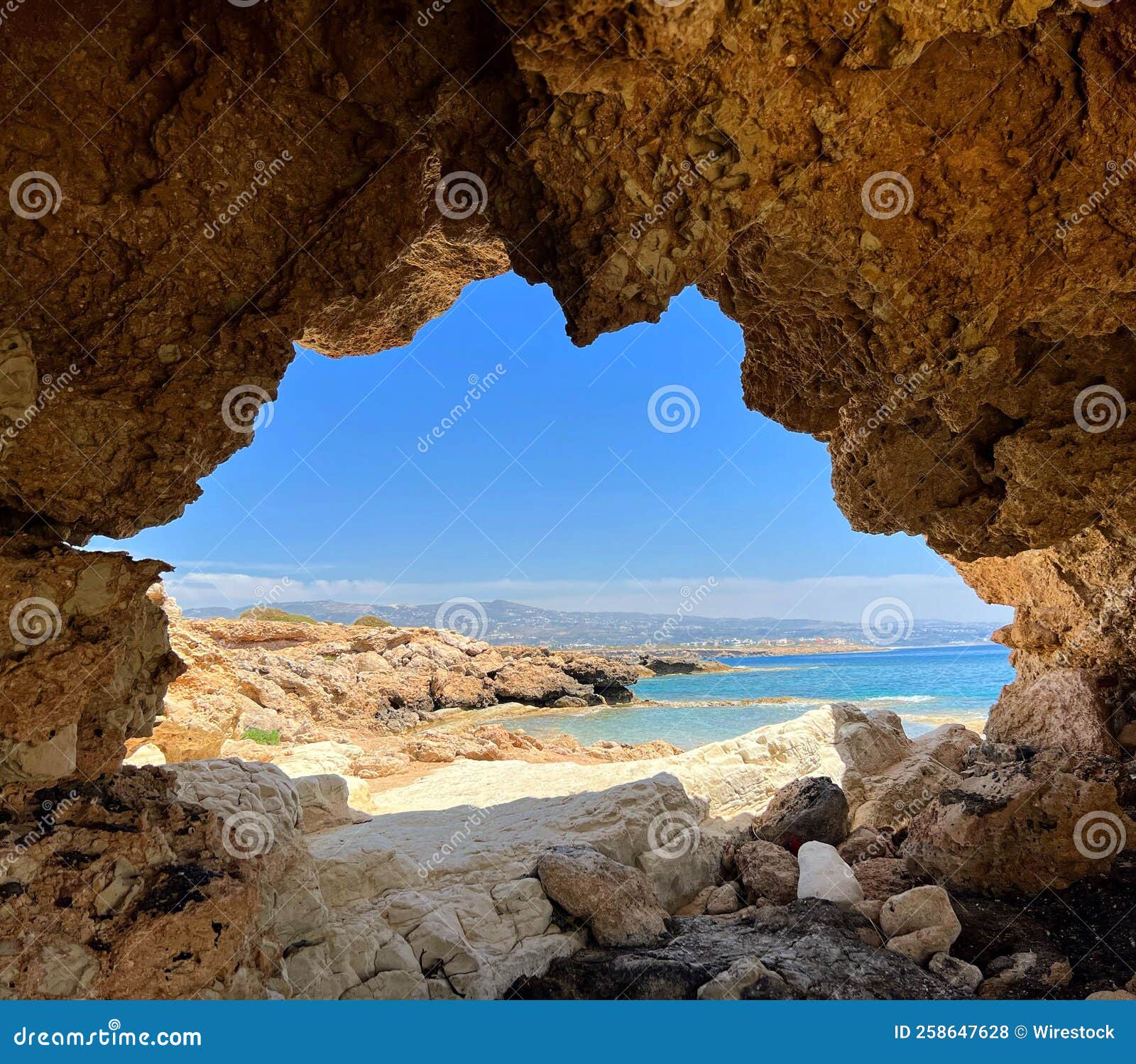 Beautiful View of the Beach from a Cave Stock Photo - Image of sunlight ...