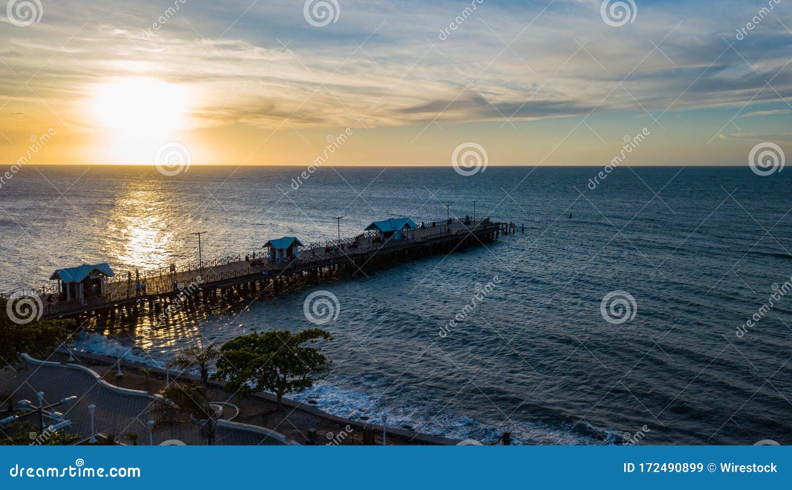 Beautiful View of a Beach Resort with a Scenery of Sunset in the ...