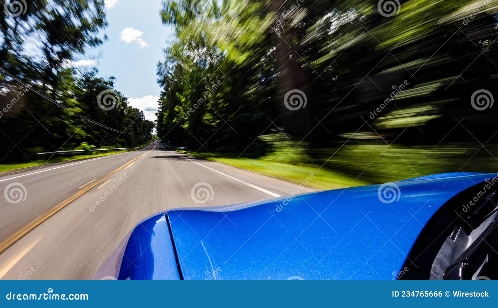 Beautiful View of a Car Driving Quickly Stock Photo - Image of green ...