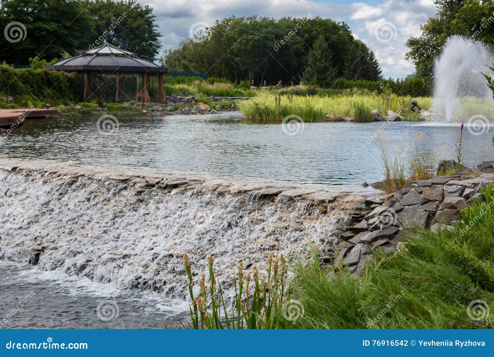 Beautiful View on Cascade of Water Flowing from Pond in Park Stock ...