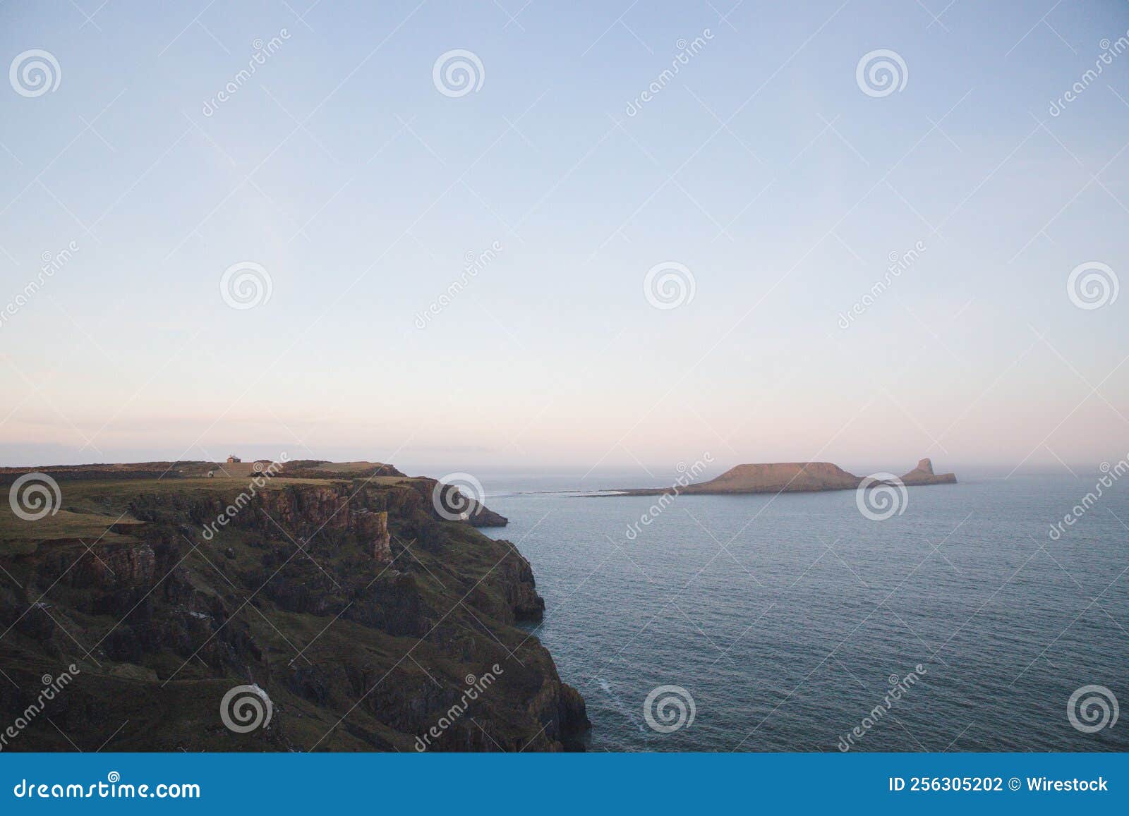 Beautiful View of the Cliff and the Island in the Distance. Stock Photo ...