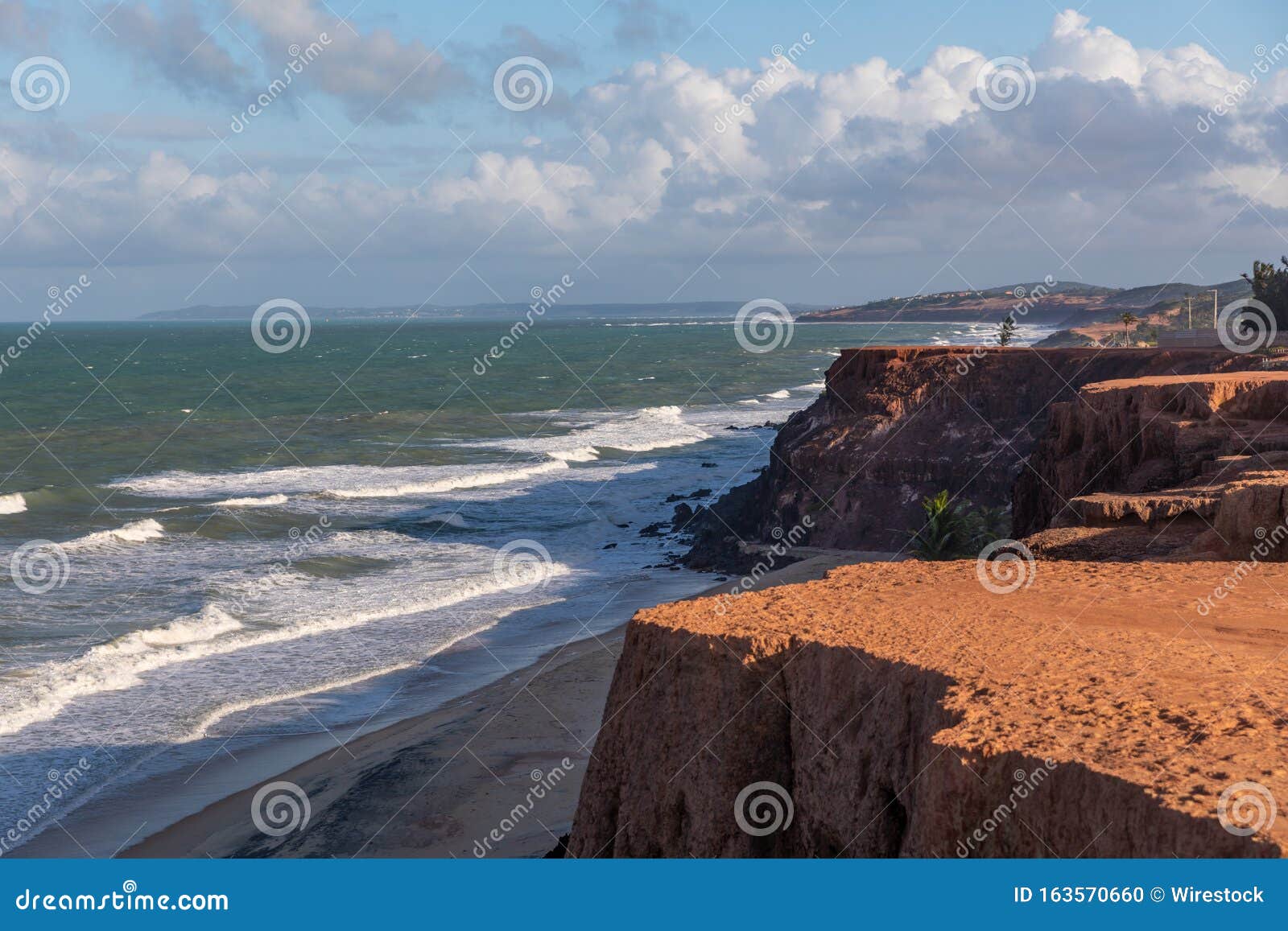 Beautiful View of the Cliffs Over the Ocean Under the Cloudy Sky ...