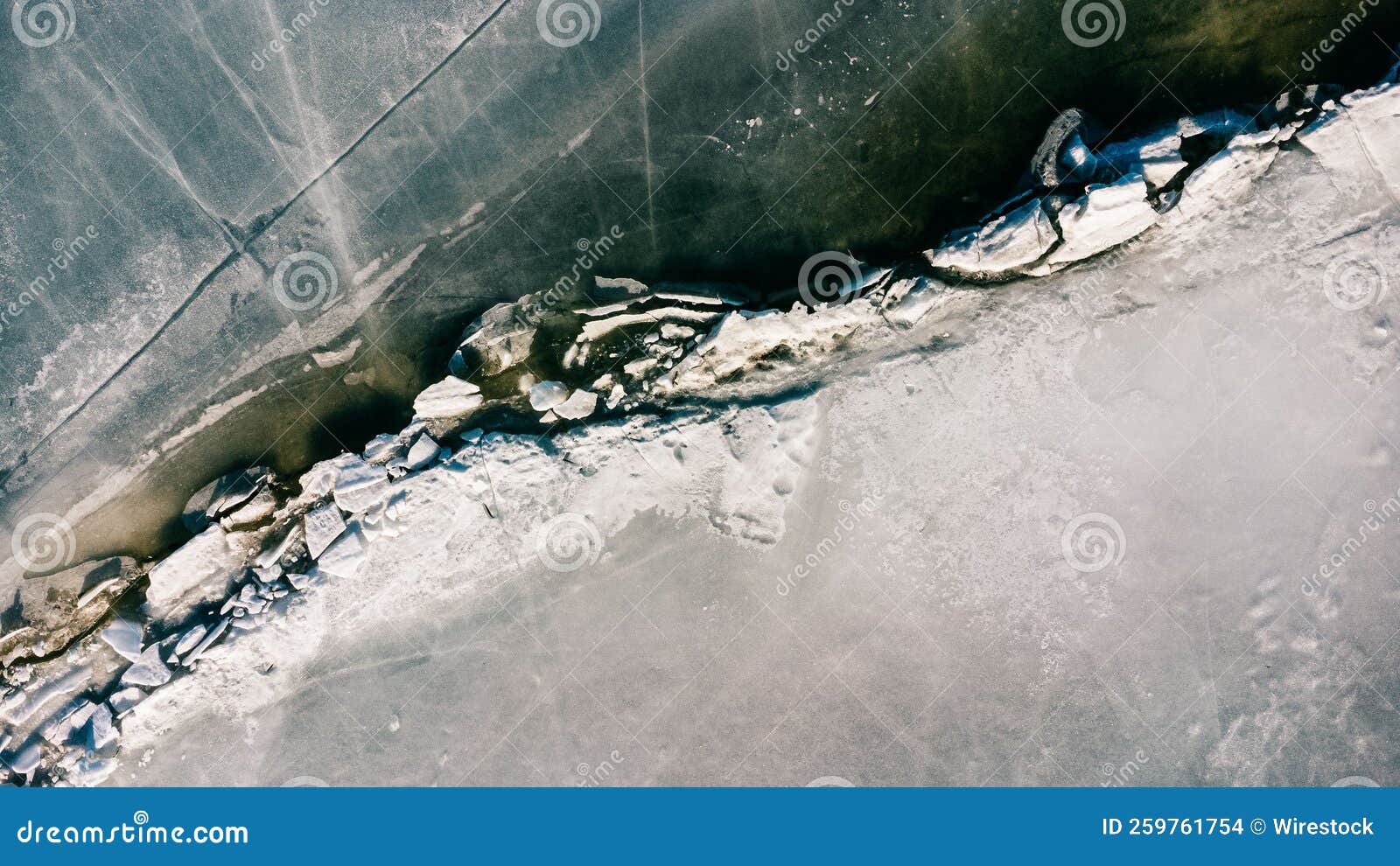 Beautiful View of Ice Covering the Dark Surface of the River, Aerial ...