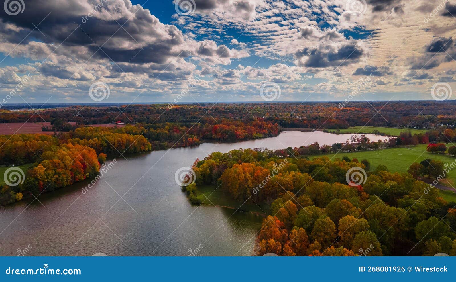 Beautiful View of a Long and Wide Tranquil River with Multiple Trees at ...