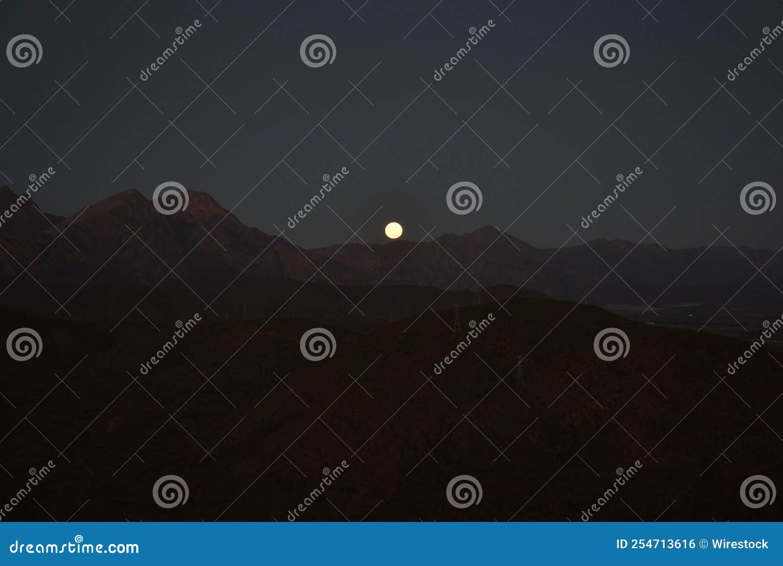 Beautiful View of the Moon with Hills in the Foreground Stock Photo ...