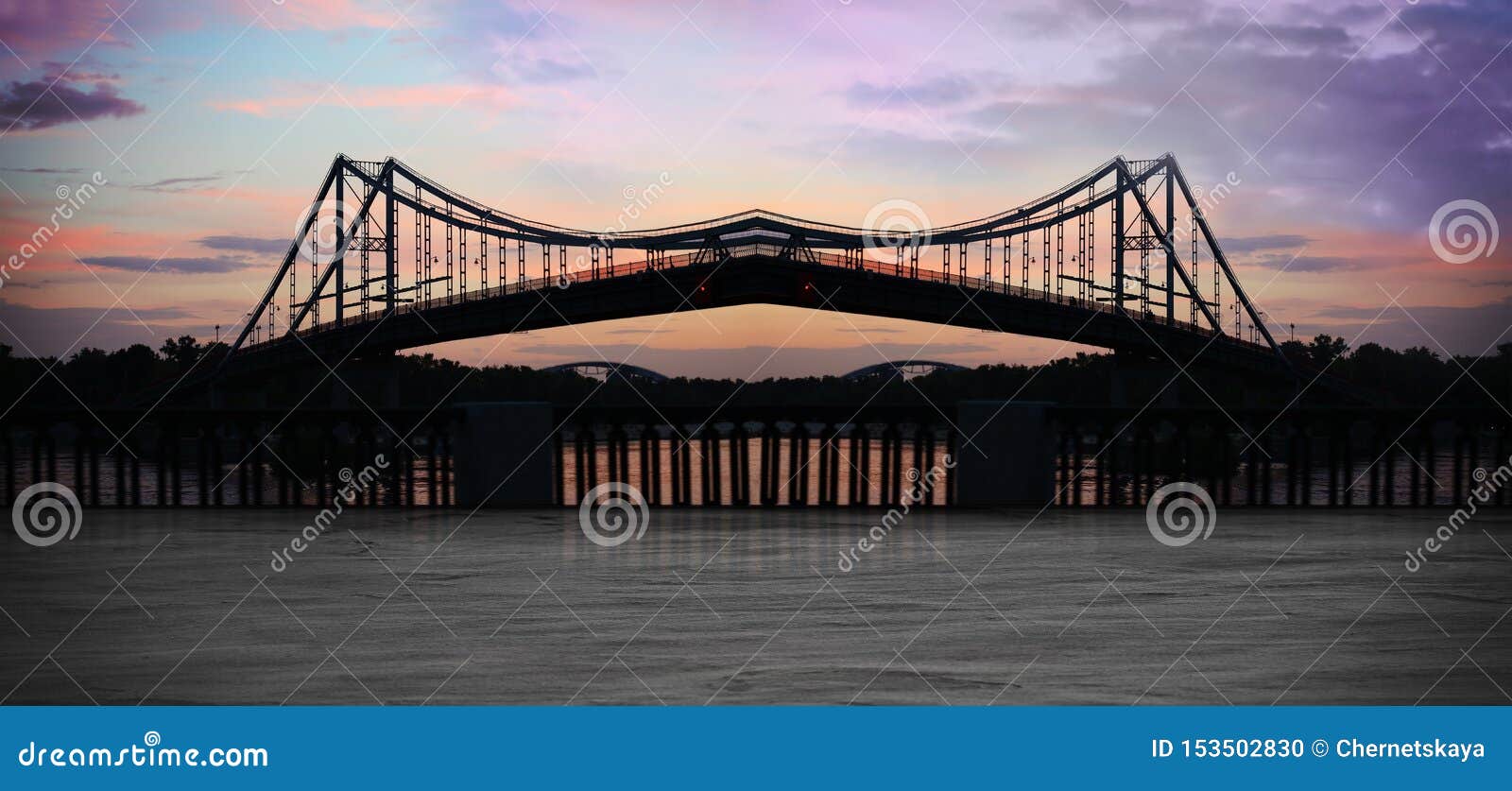 Beautiful View of Pedestrian Bridge Over River at Evening Stock Photo ...