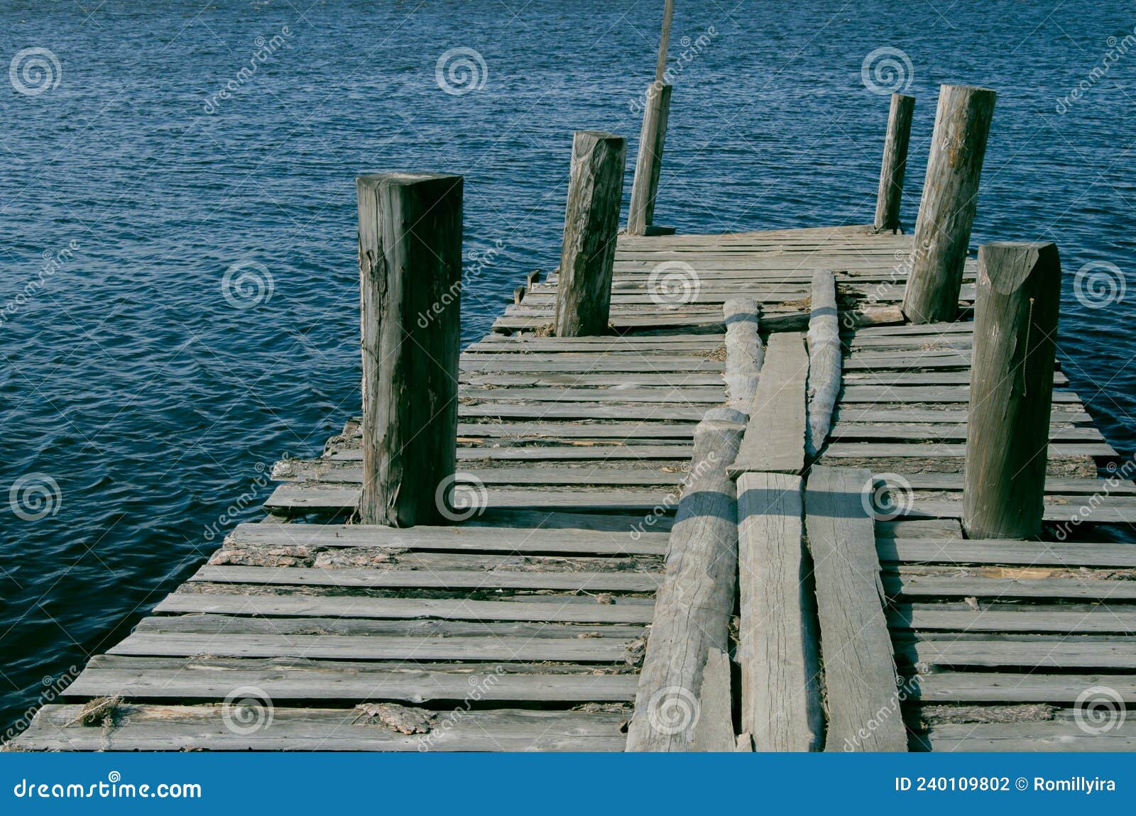 Beautiful View of the Pier, Going into the Blue Water. Stock Photo ...