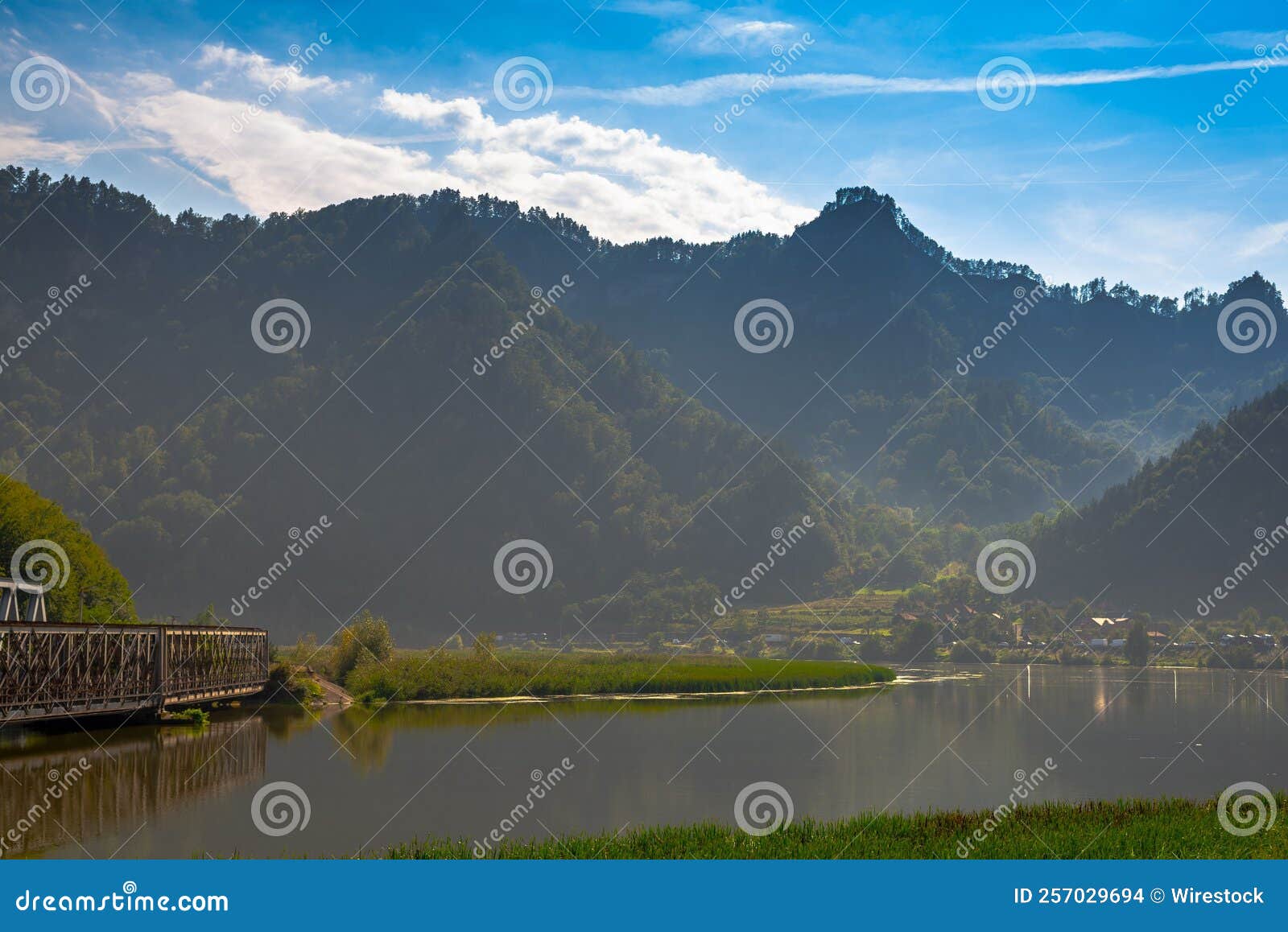 Beautiful View of a River with a Bridge and Trees on Mountains Stock ...