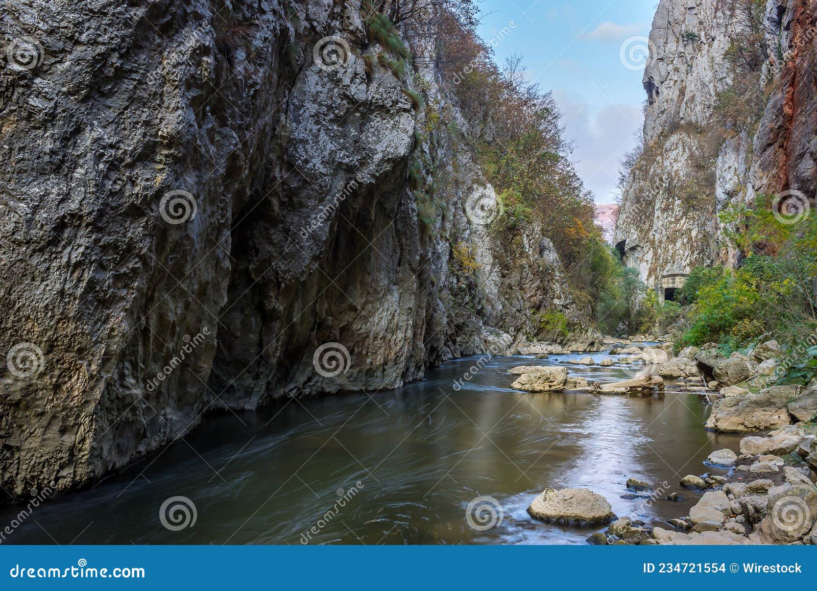 Beautiful View of a River Flowing in a Narrow Deep Valley between High ...
