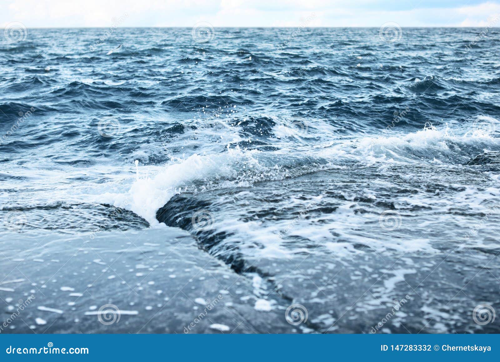 View of sea on windy day stock photo. Image of rest - 147283332