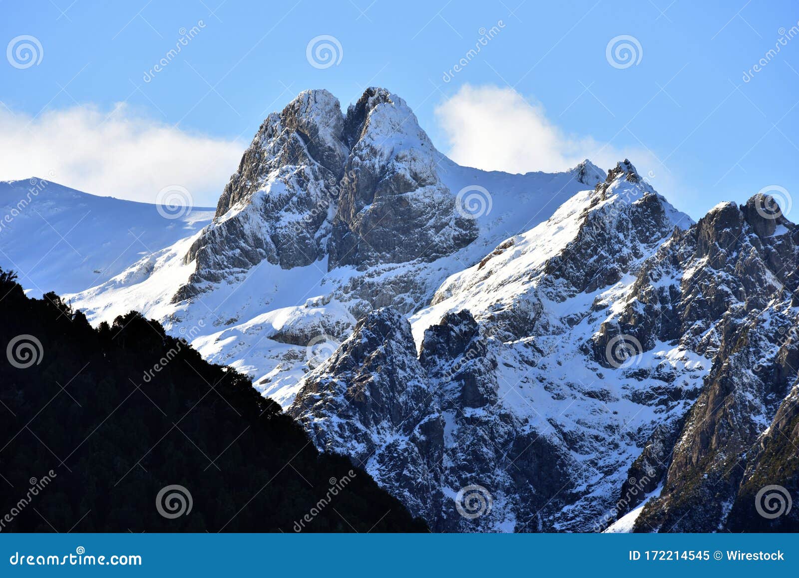 A Beautiful View Of A Ledge Of A Mountain Under Which A Bench And An ...