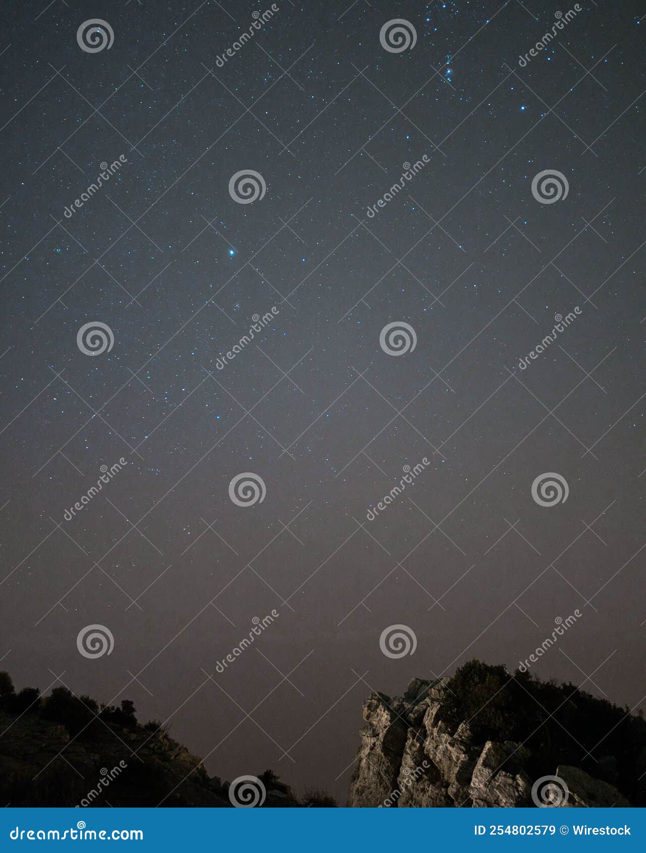 Beautiful View of a Starry Sky Over Cliffs with Trees Stock Image ...