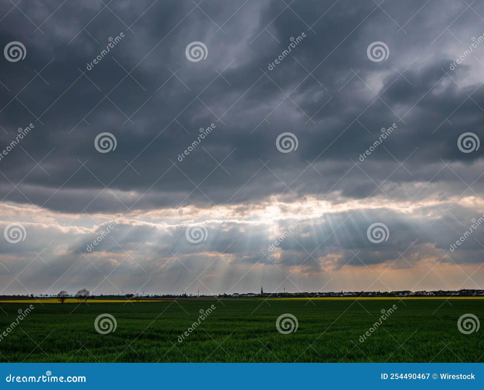 Beautiful View of Sun Rays Coming through Clouds in the Field Stock ...