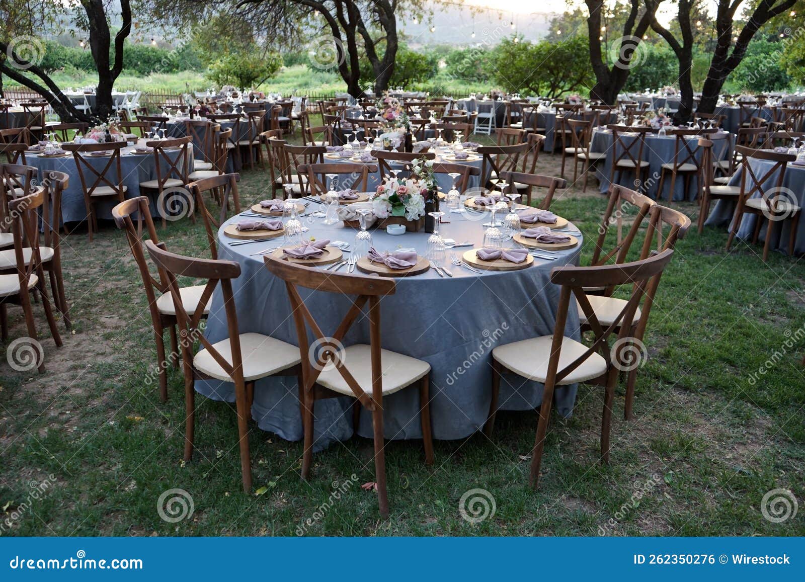 Beautiful View of Tables with Table Cloths with Patterns in the Garden ...